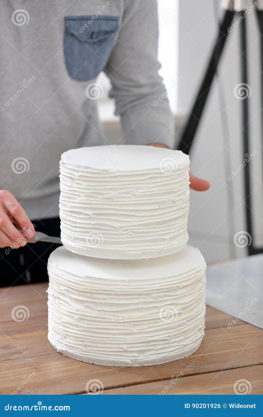 Confectioner Stacking Layers of White Naked Wedding Torte Cake Stock ...