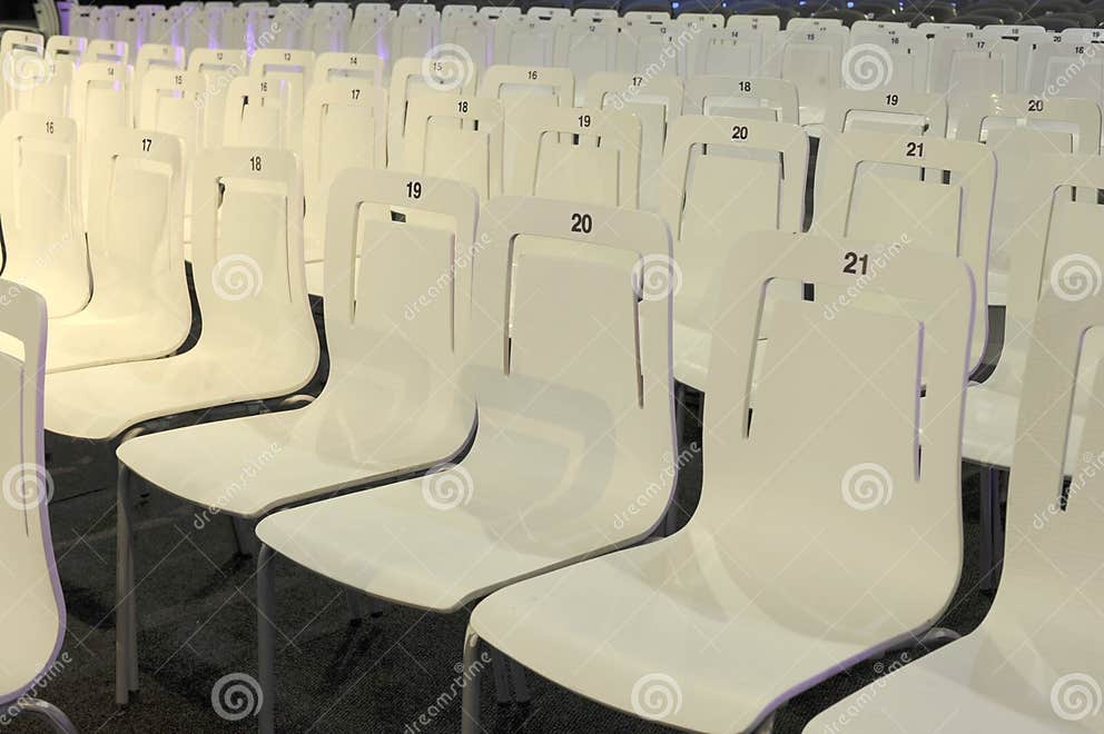Conference Chairs with Numbers in a Row Stock Photo - Image of ...