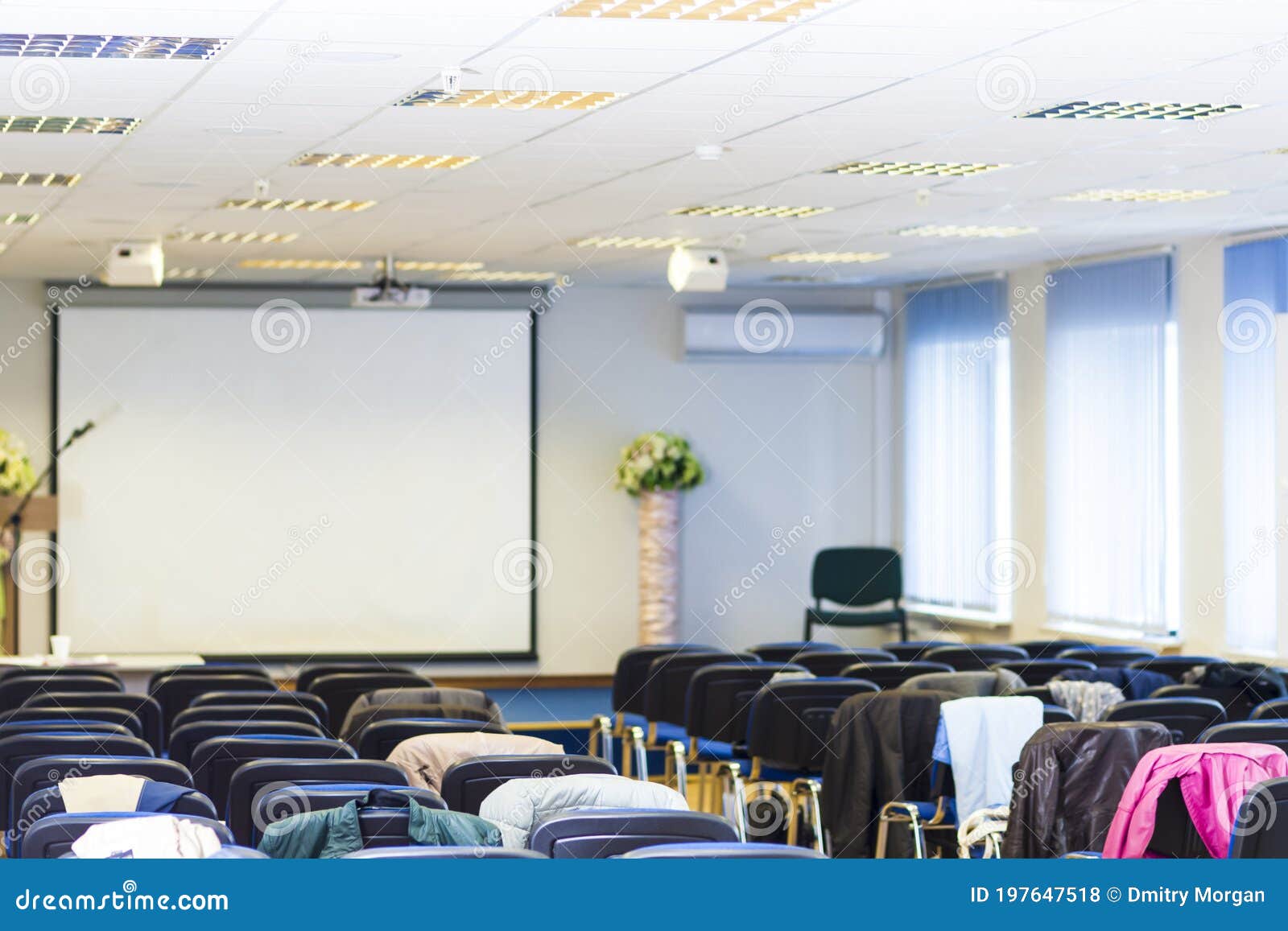 Conference Hall with Chairs in Front of Stage with Screen Stock Photo ...