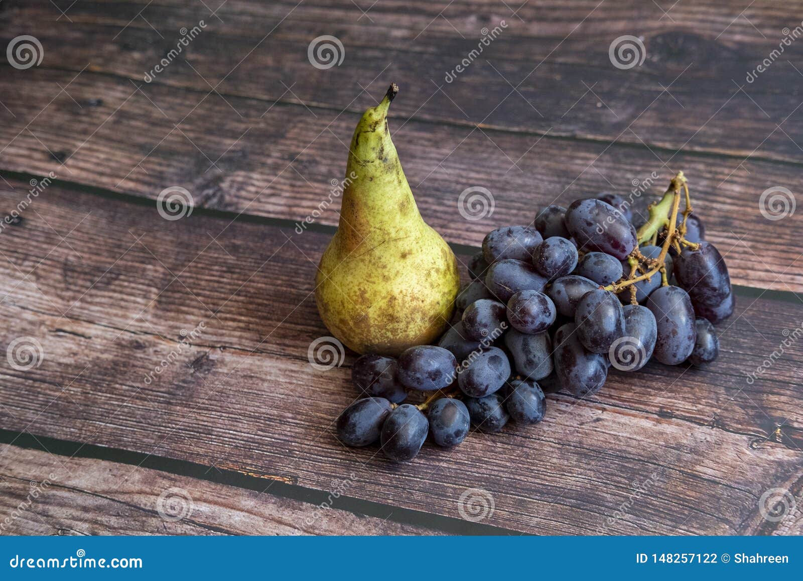 Conference Pear Also Known As Pyrus Communis and Seedless Red Grape on ...