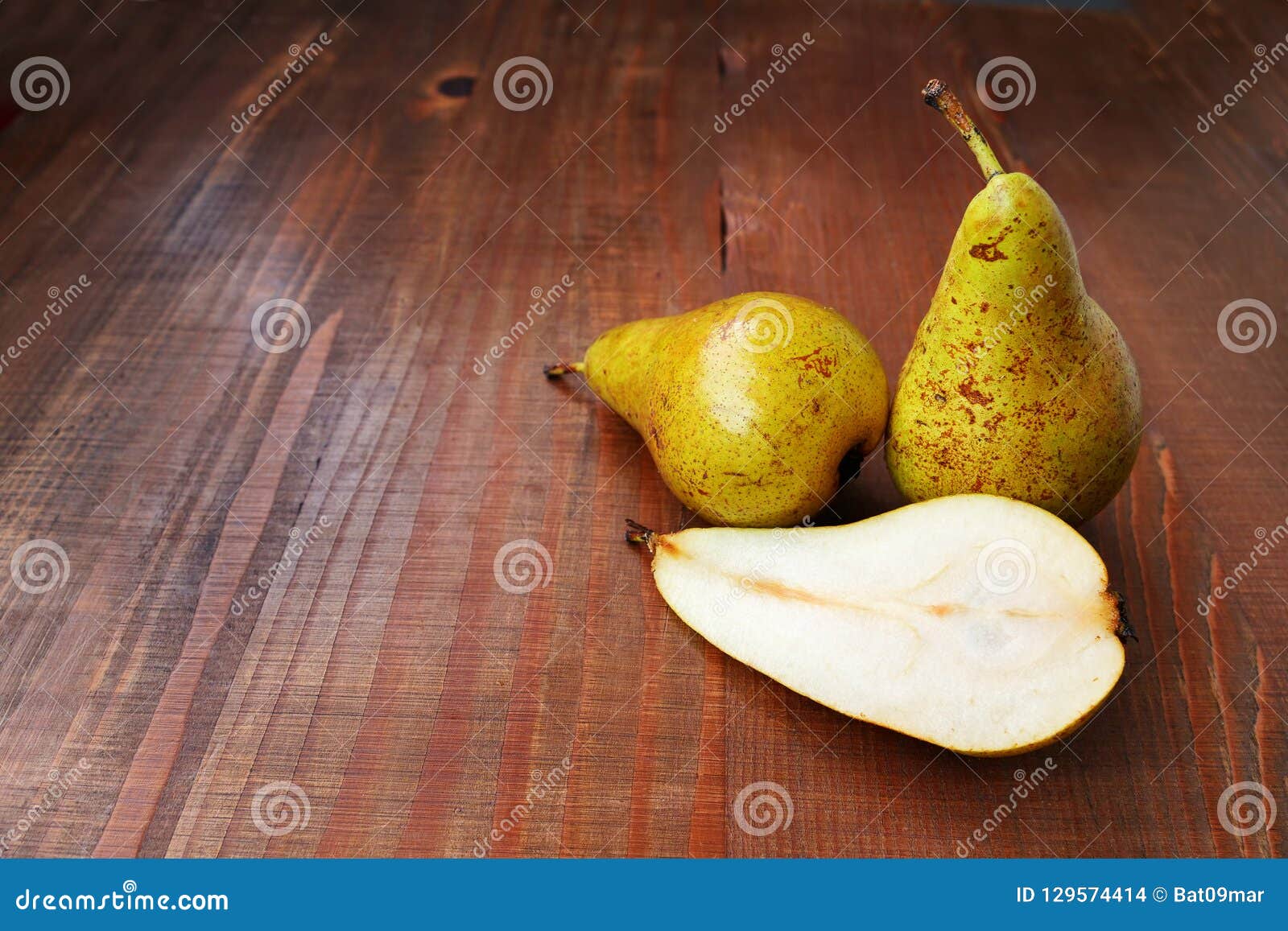 Conference Pears on Wooden Table Stock Photo - Image of delicious ...
