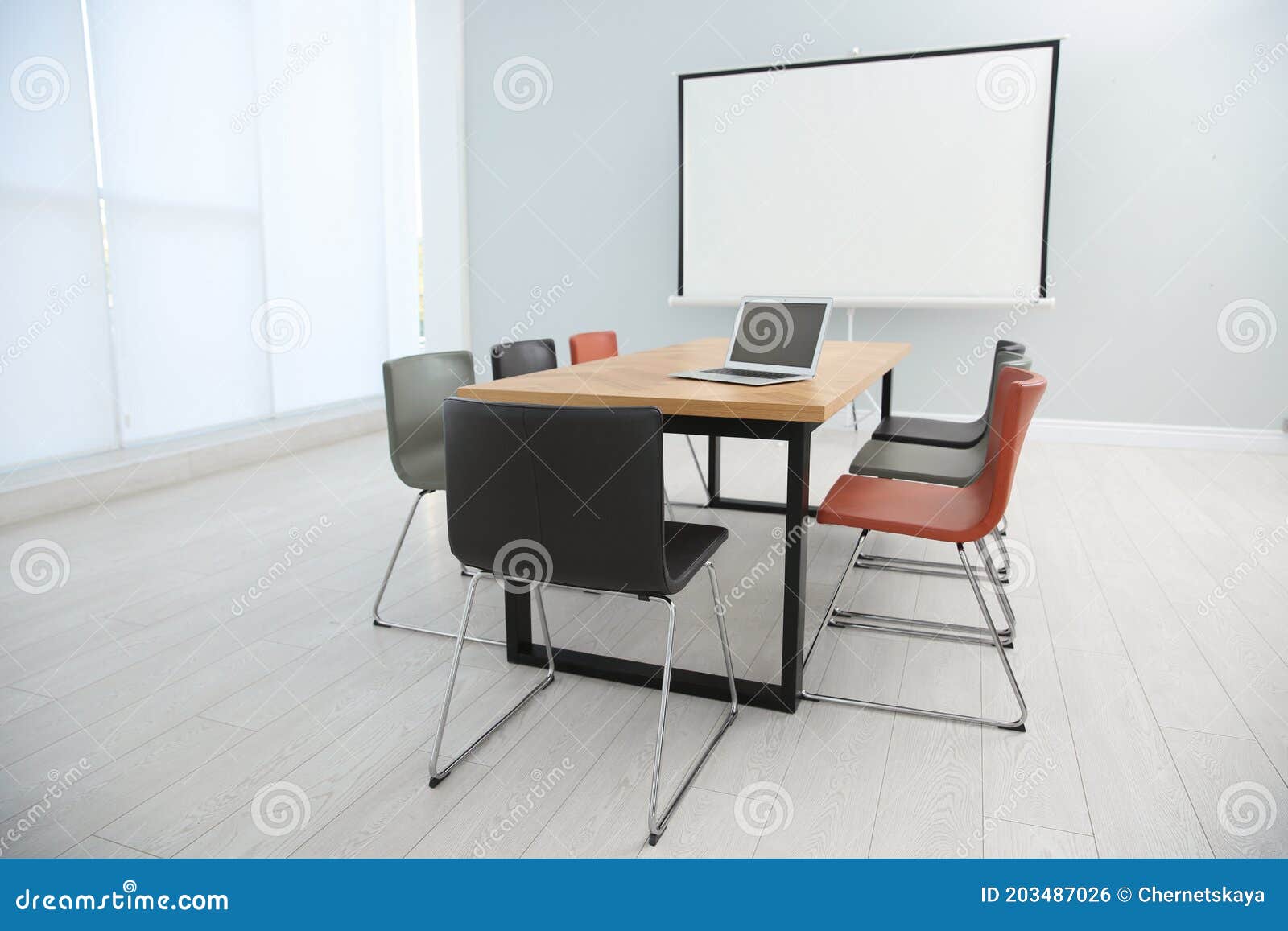 Conference Room Interior with Wooden Table and Video Projection Screen ...
