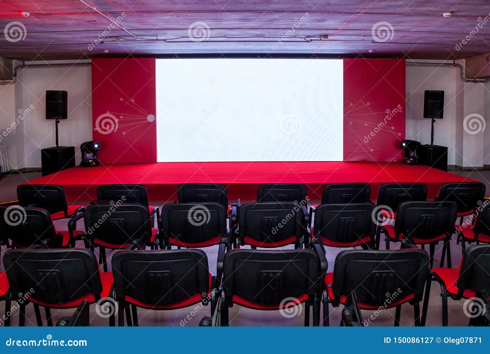Conference Room with a Red Stage and Chairs Stock Image - Image of ...