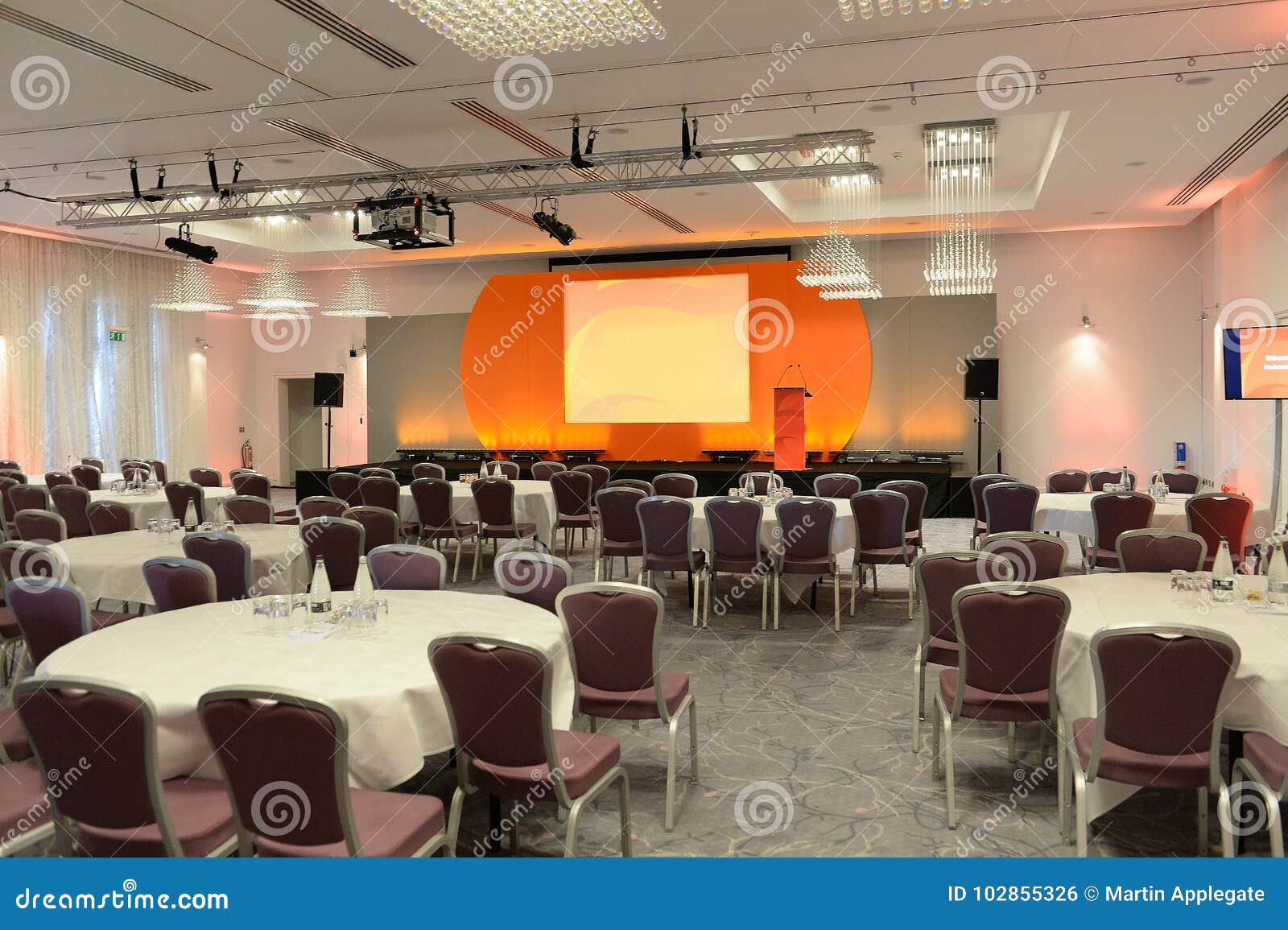 Conference room with stage stock photo. Image of hotel - 102855326