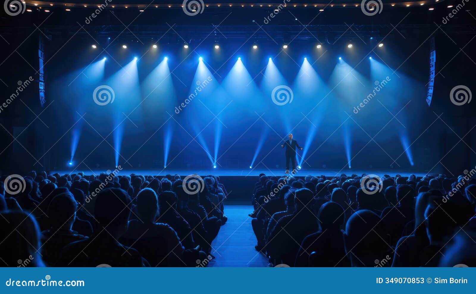 A Conference Stage with a Spotlight on a Motivational Stock ...