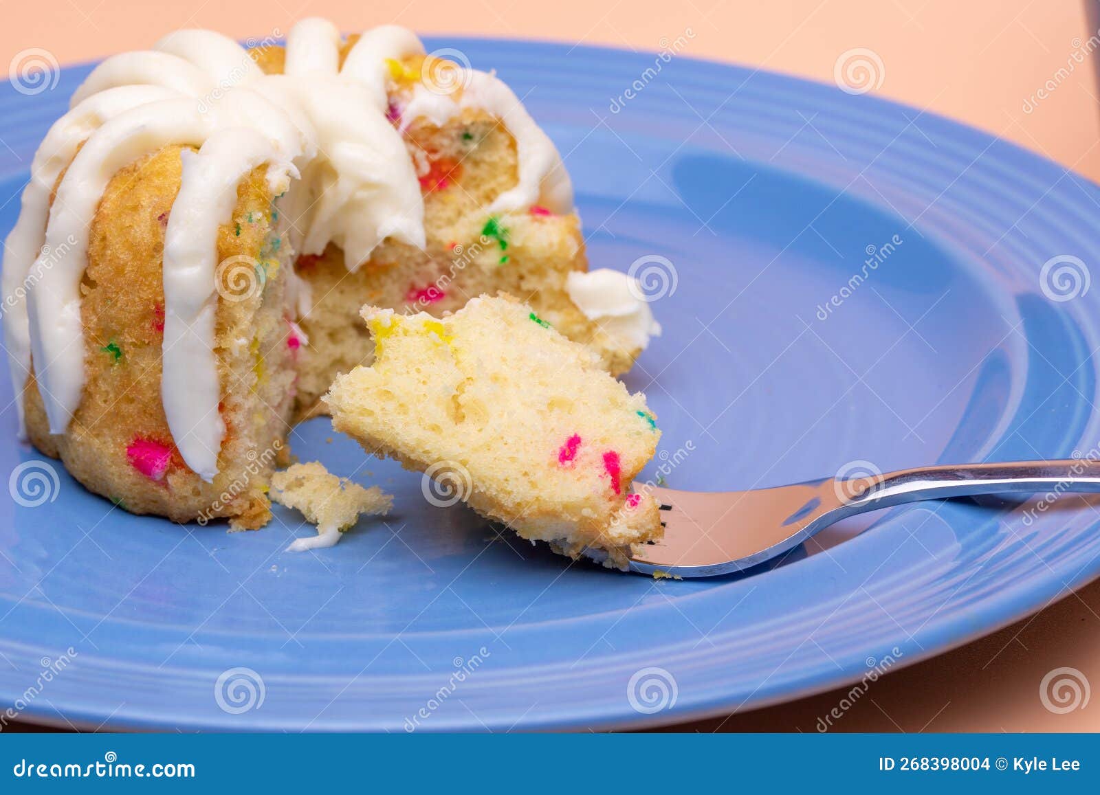 Confetti Bunt Cake on Blue Plate Stock Photo - Image of icing, colours ...