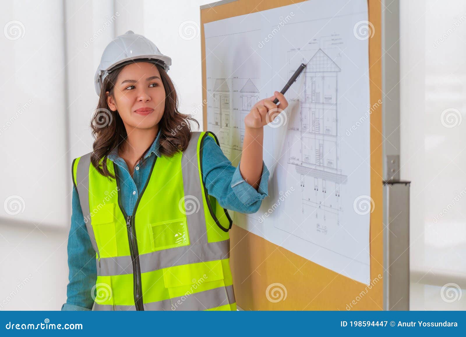 Confidence Female Engineer is Presenting Building Plan Drawing on the ...