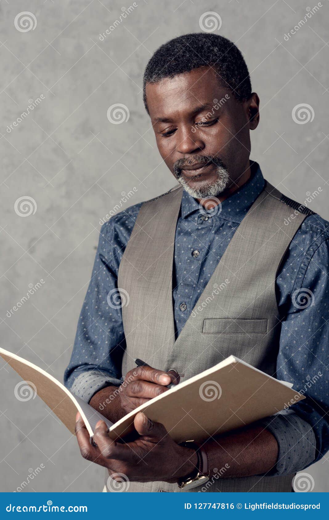 Confident African American Businessman Writing Stock Photo - Image of ...