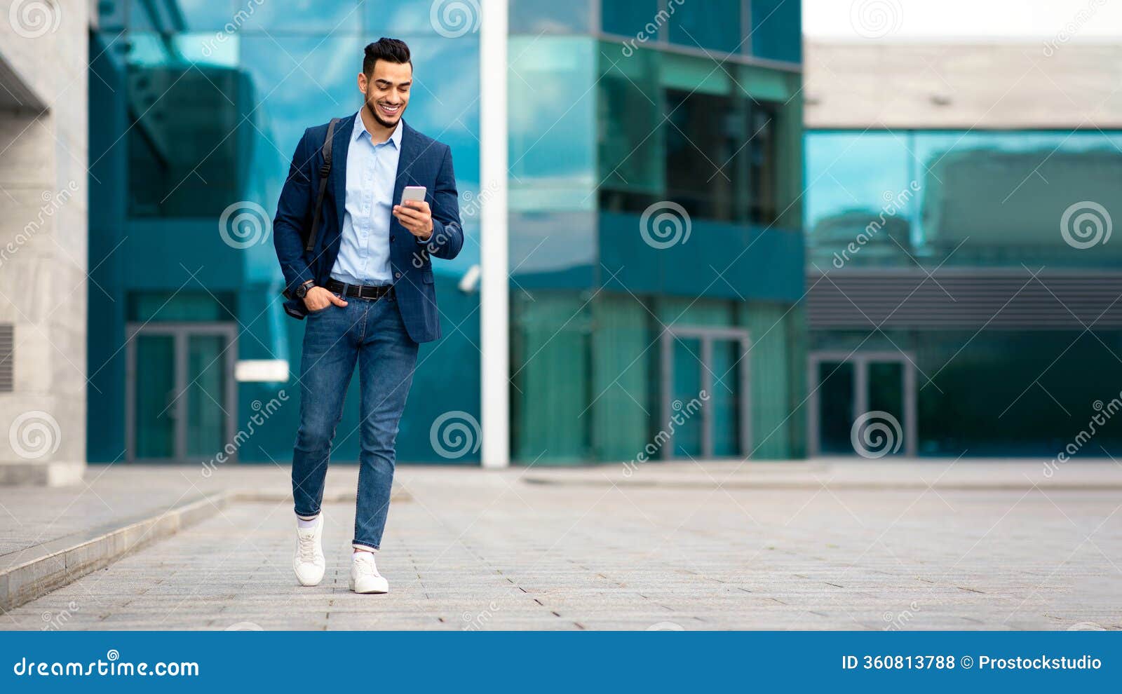 Confident Arabic Guy Programmer with Backpack Walking by Street Stock ...