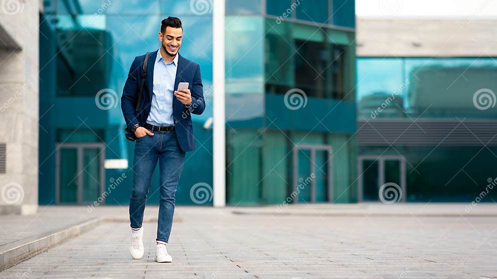 Confident Arabic Guy Programmer with Backpack Walking by Street Stock ...