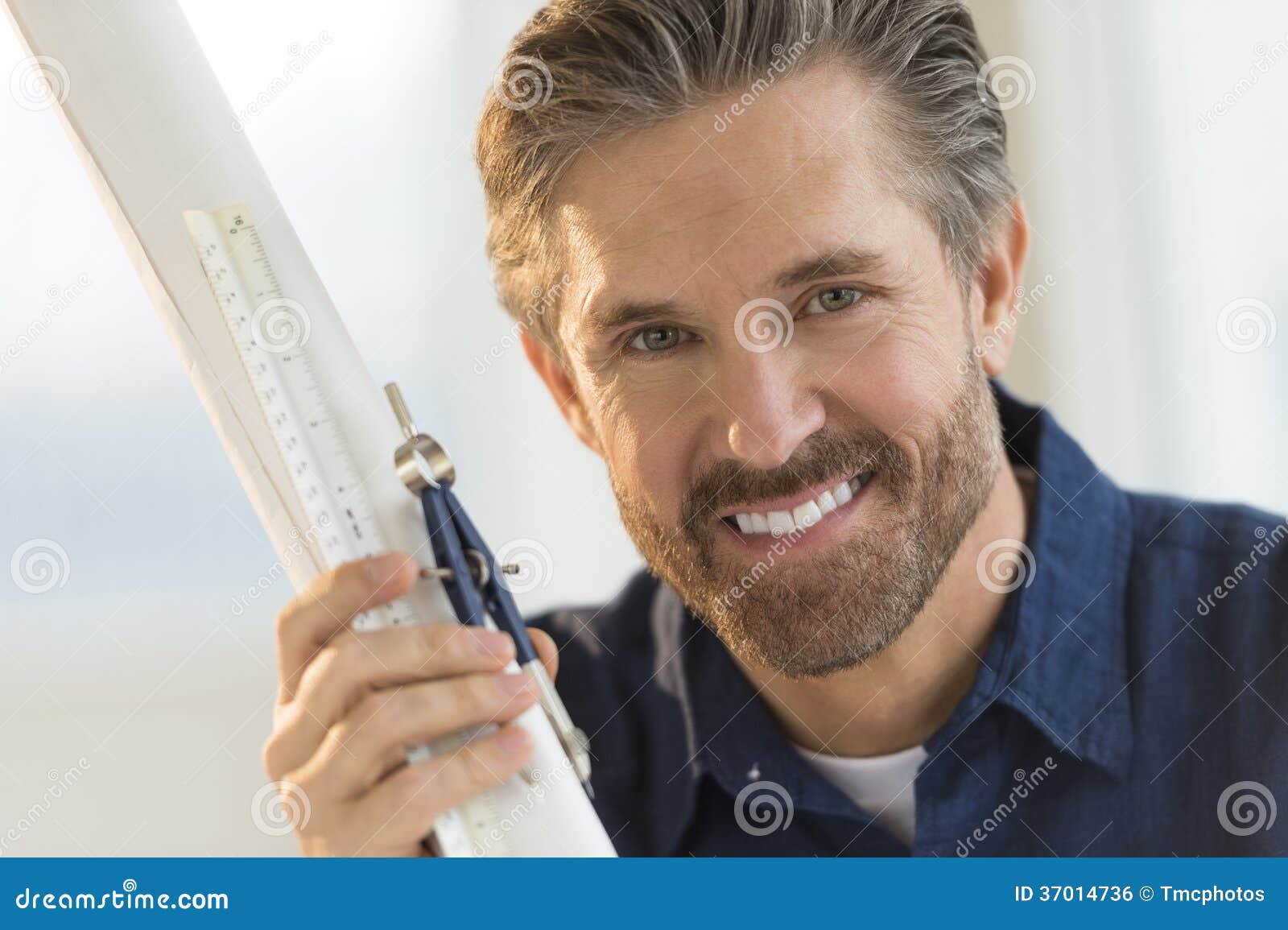 Confident Architect Holding Compass and Blueprint in Office Stock Photo ...