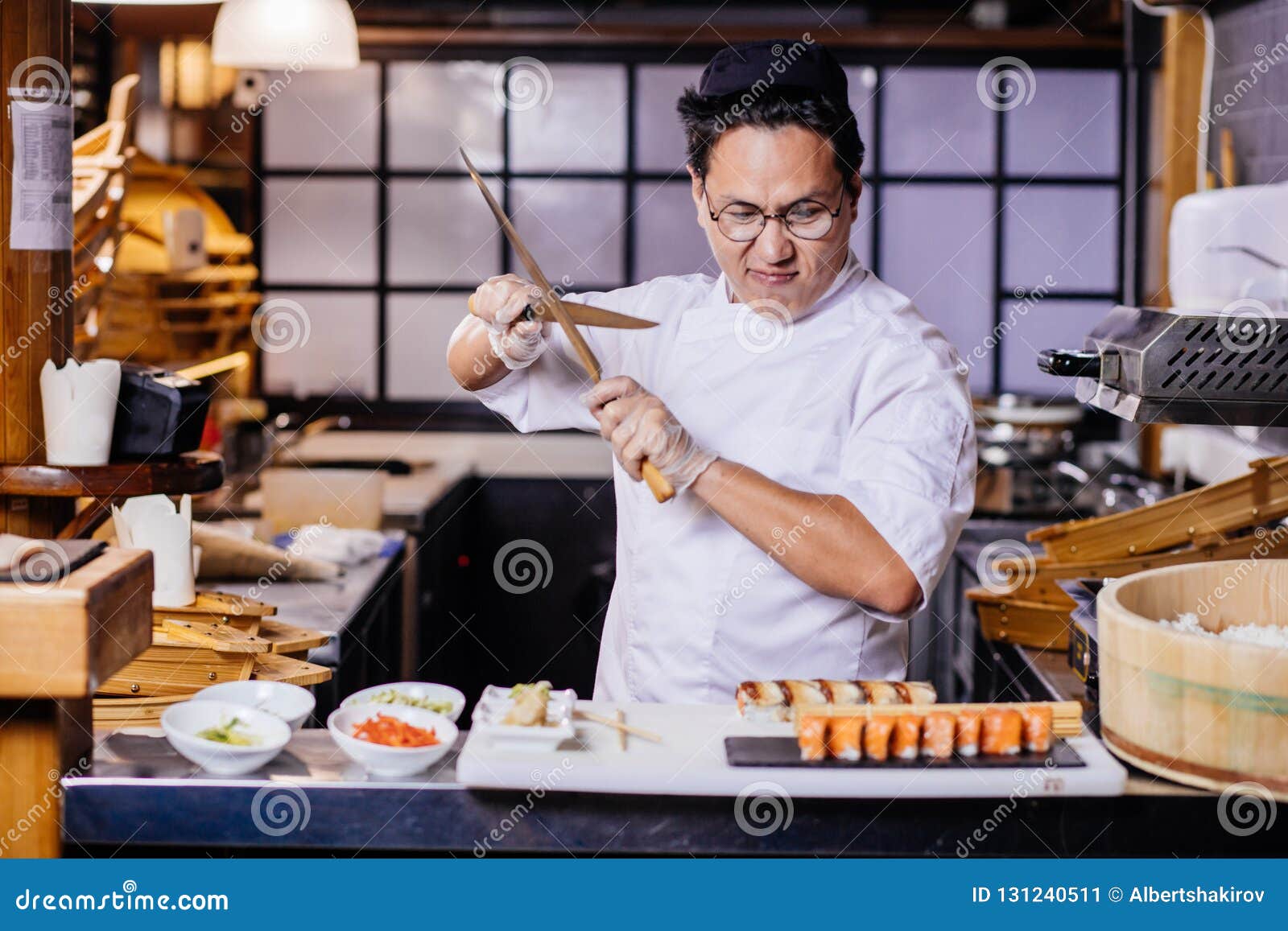 Confident Asian Chef is Going To Cut Roll Stock Image - Image of craft ...