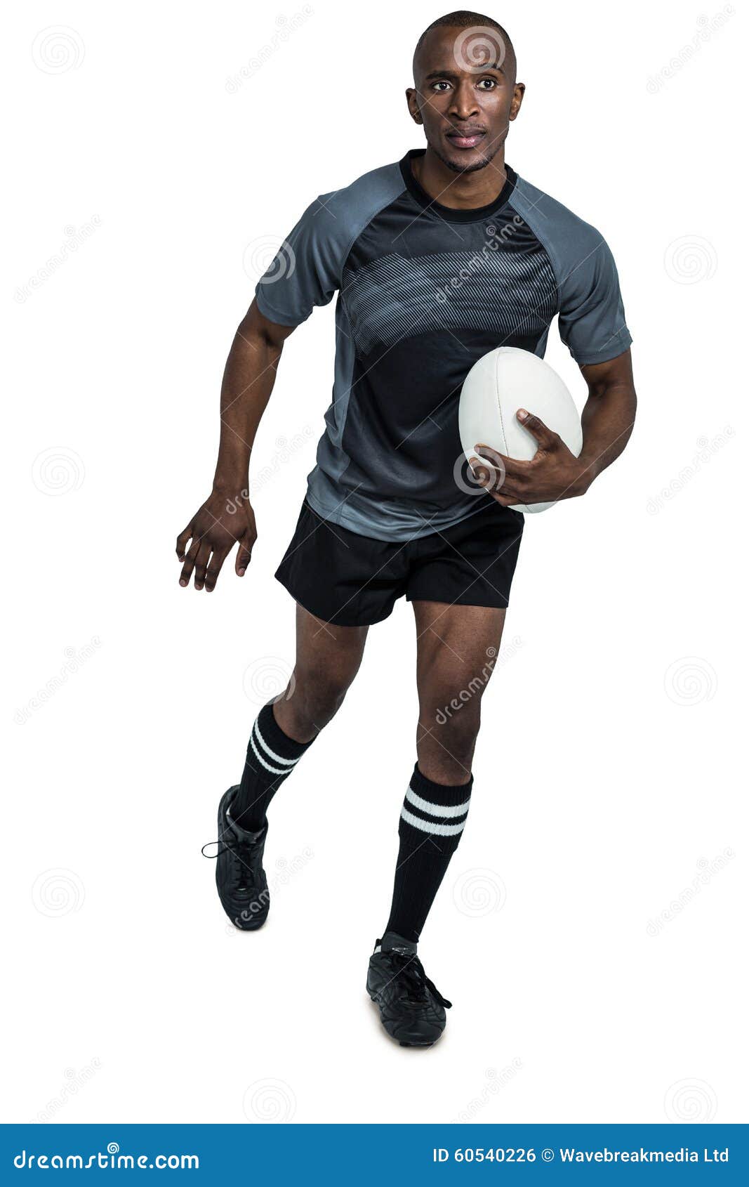 Confident Athlete Running with Rugby Ball Stock Photo - Image of ...