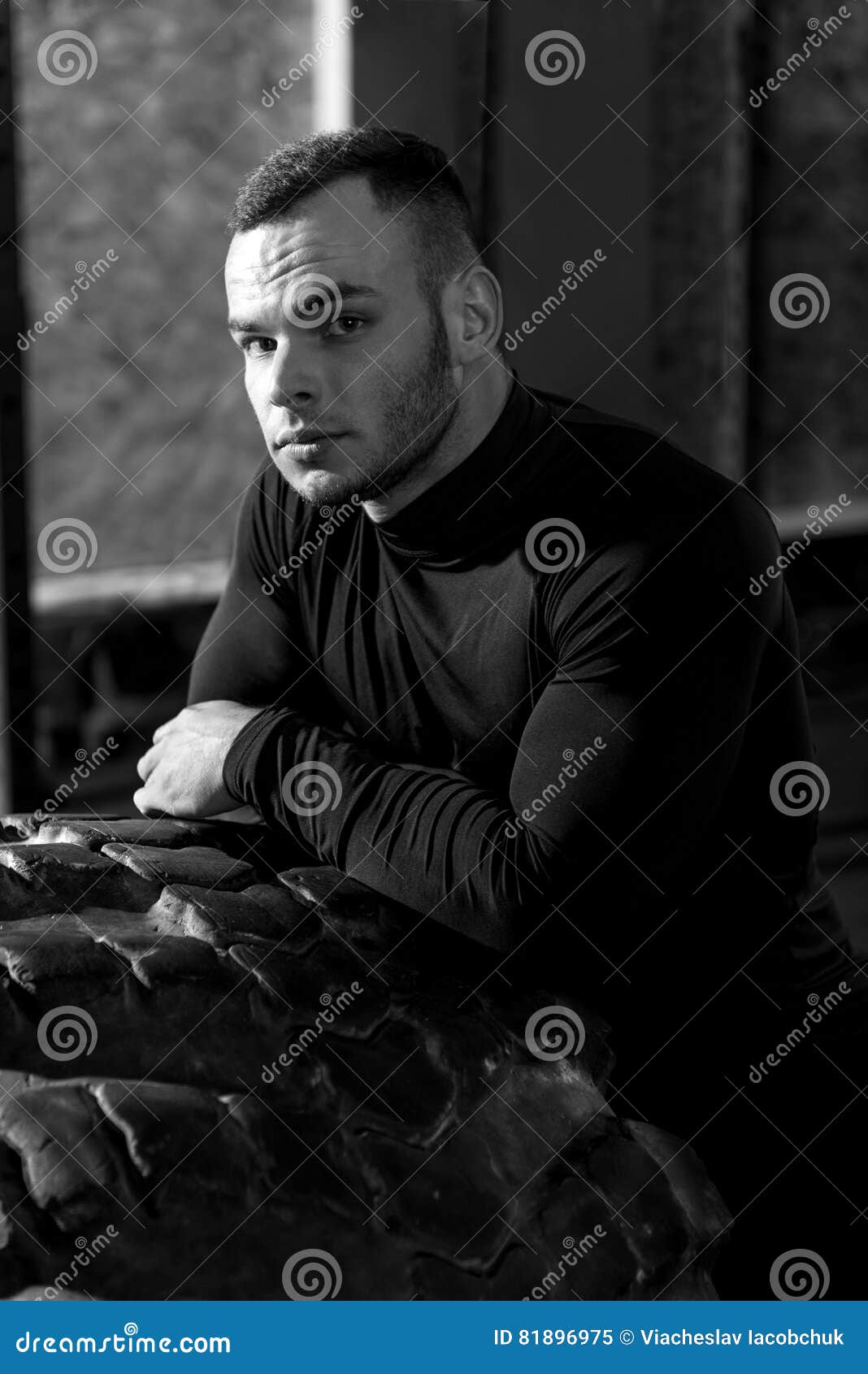 Confident Athletic Man Leaning on the Giant Tire Stock Image - Image of ... Confident Athletic Man Leaning on the Giant Tire Stock Image - Image of ...