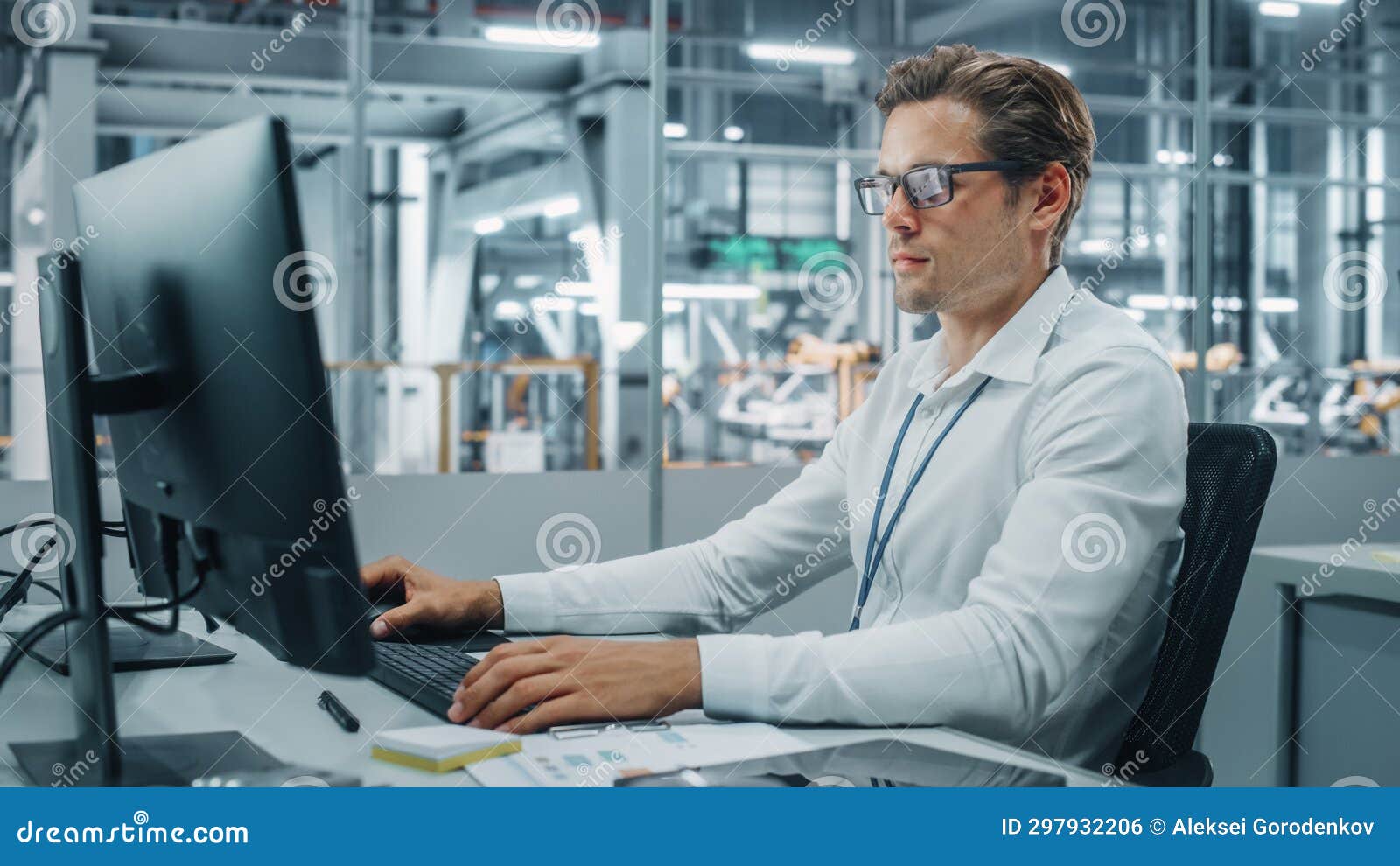 Confident Automotive Engineer Working on Desktop Computer in Modern ...