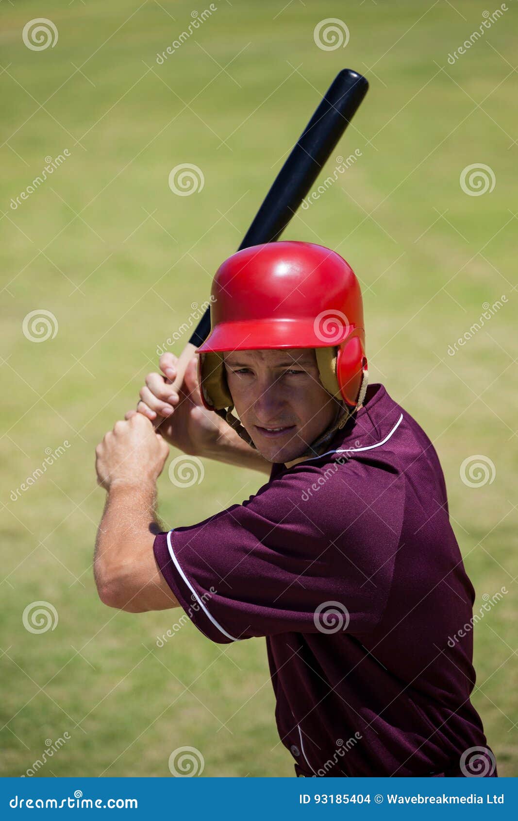 Confident Baseball Player Hitting with Bat Stock Photo - Image of ...