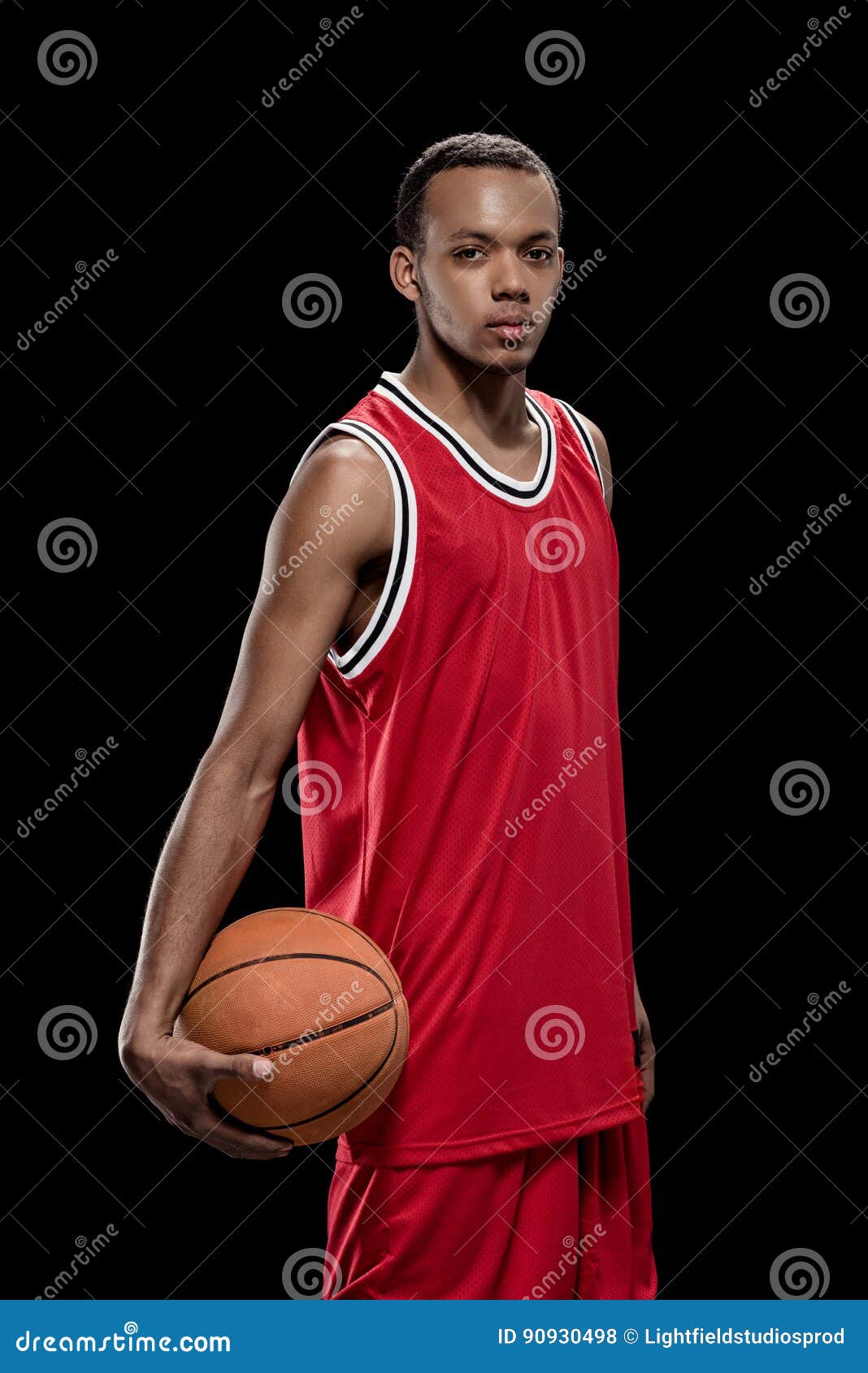 Confident Basketball Player Standing with Ball and Looking at Camera ...