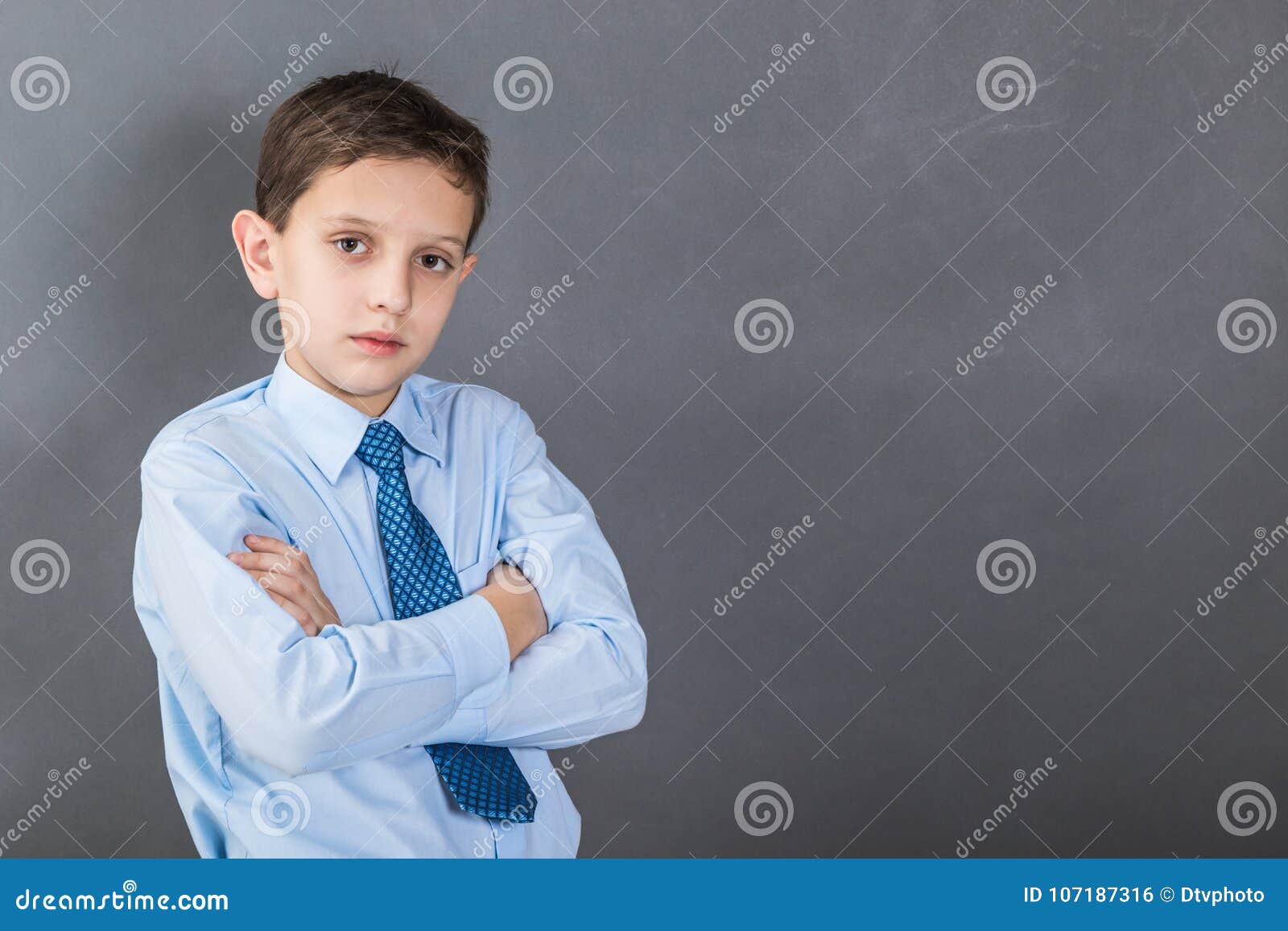 Confident Boy Student before Dark Background with Copy-space Stock ...