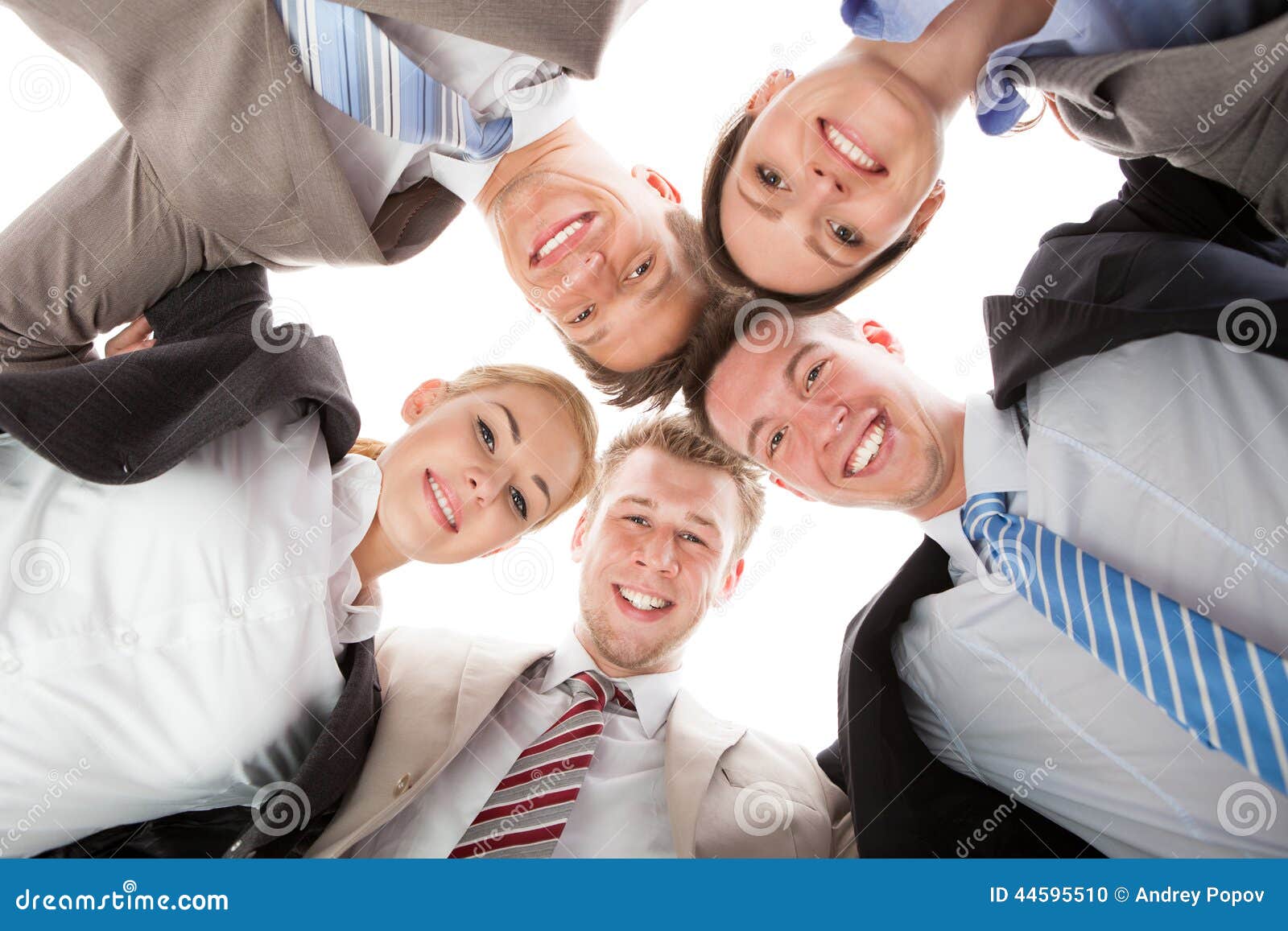 Confident Business Team Making Huddle Stock Photo - Image of female ...