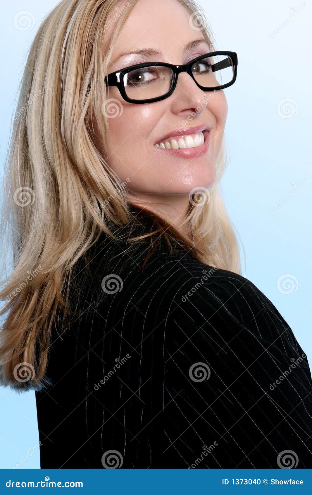 Confident Business Worker Looking Over Shoulder and Smiling Stock Photo ...