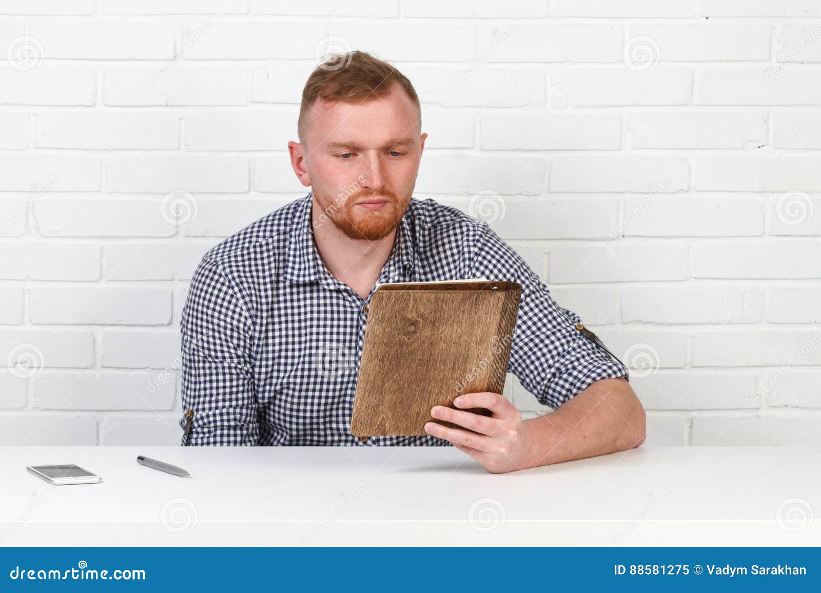 Confident Businessman Reading a Contract. Businessman Reading a ... Confident Businessman Reading a Contract. Businessman Reading a ...