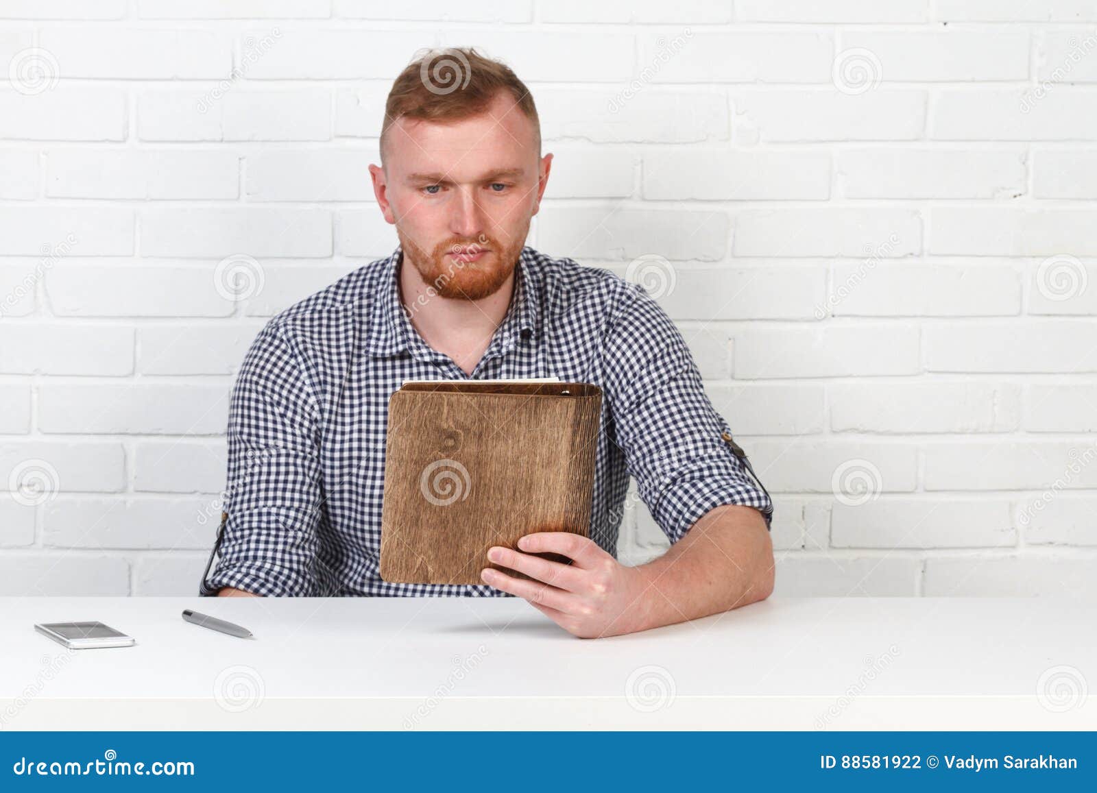 Confident Businessman Reading a Contract. Businessman Reading a ... Confident Businessman Reading a Contract. Businessman Reading a ...