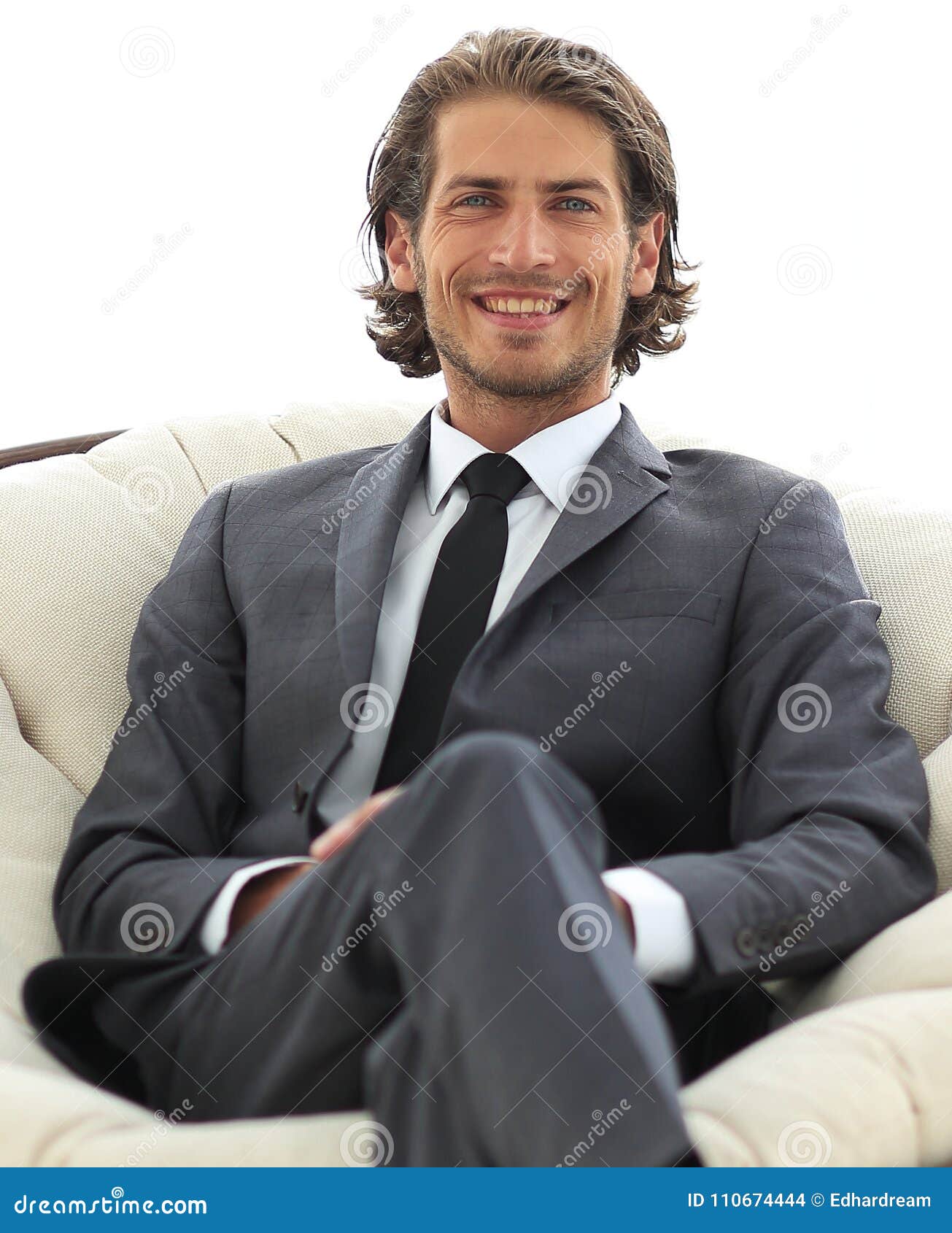 Confident Businessman Sitting in a Large Comfortable Chair. Stock Photo ... Confident Businessman Sitting in a Large Comfortable Chair. Stock Photo ...