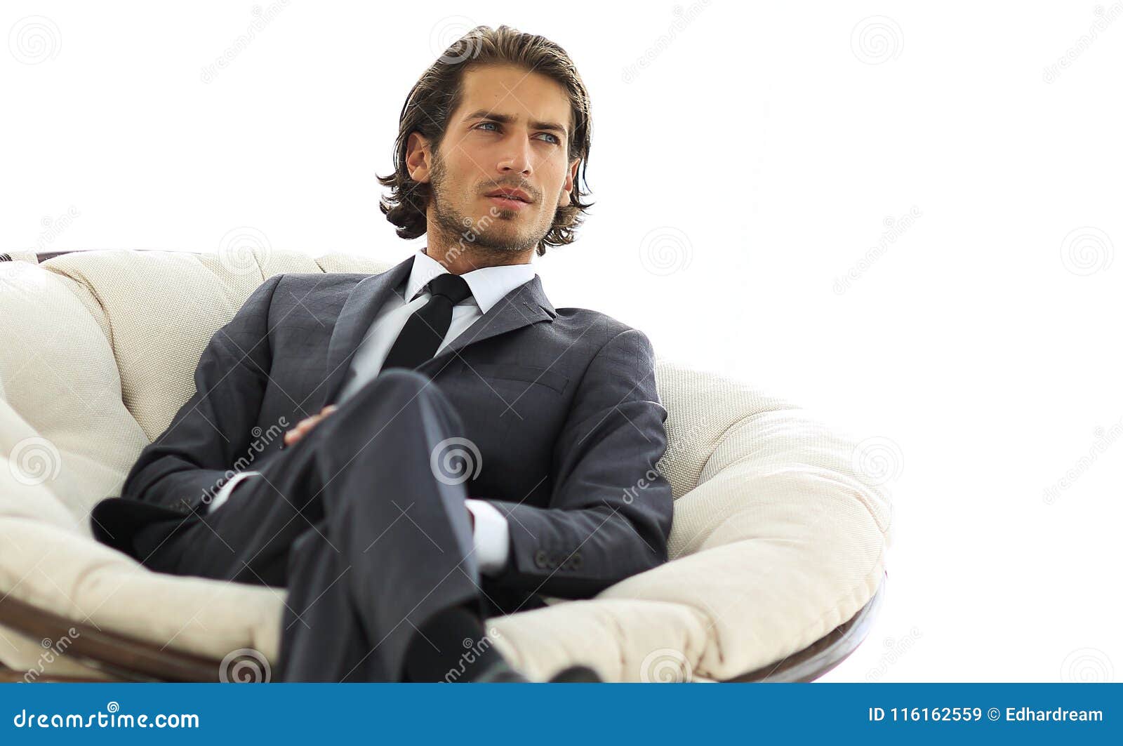 Confident Businessman Sitting in a Large Comfortable Chair. Stock Image ... Confident Businessman Sitting in a Large Comfortable Chair. Stock Image ...