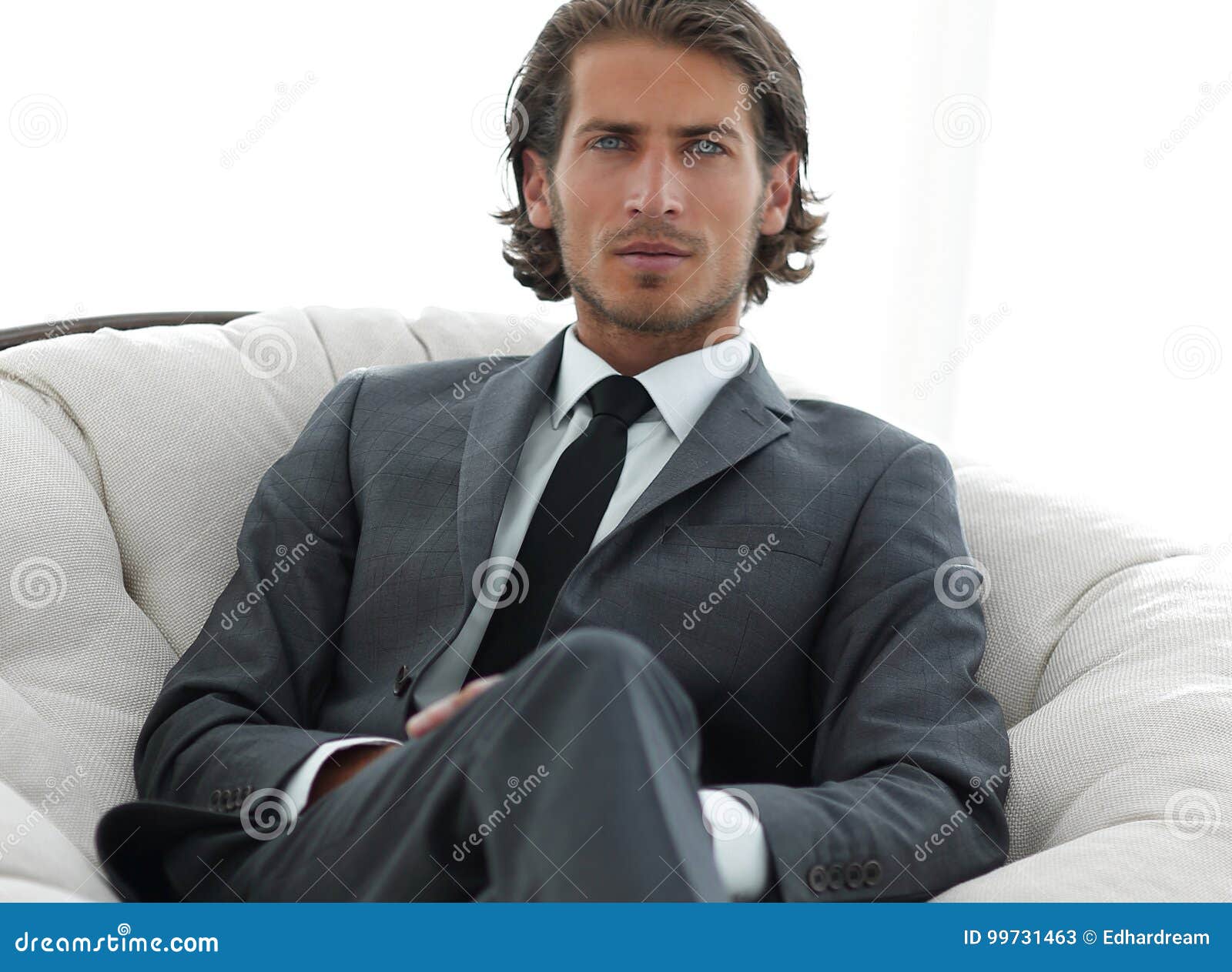 Confident Businessman Sitting in a Large Comfortable Chair. Stock Image ... Confident Businessman Sitting in a Large Comfortable Chair. Stock Image ...