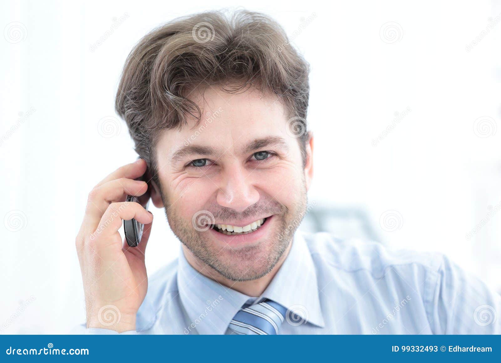 Confident Businessman Talking on the Phone and Smiling at Camera Stock ... Confident Businessman Talking on the Phone and Smiling at Camera Stock ...