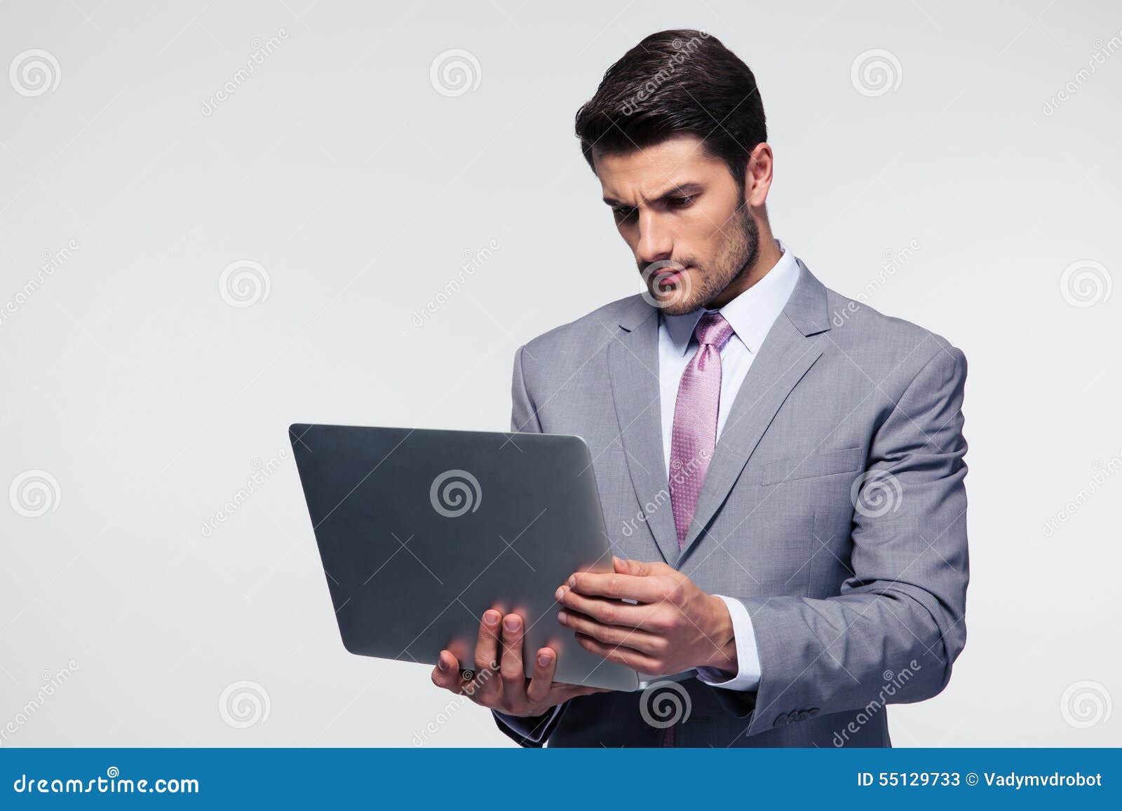 Confident Businessman Using Laptop Stock Image - Image of office ...