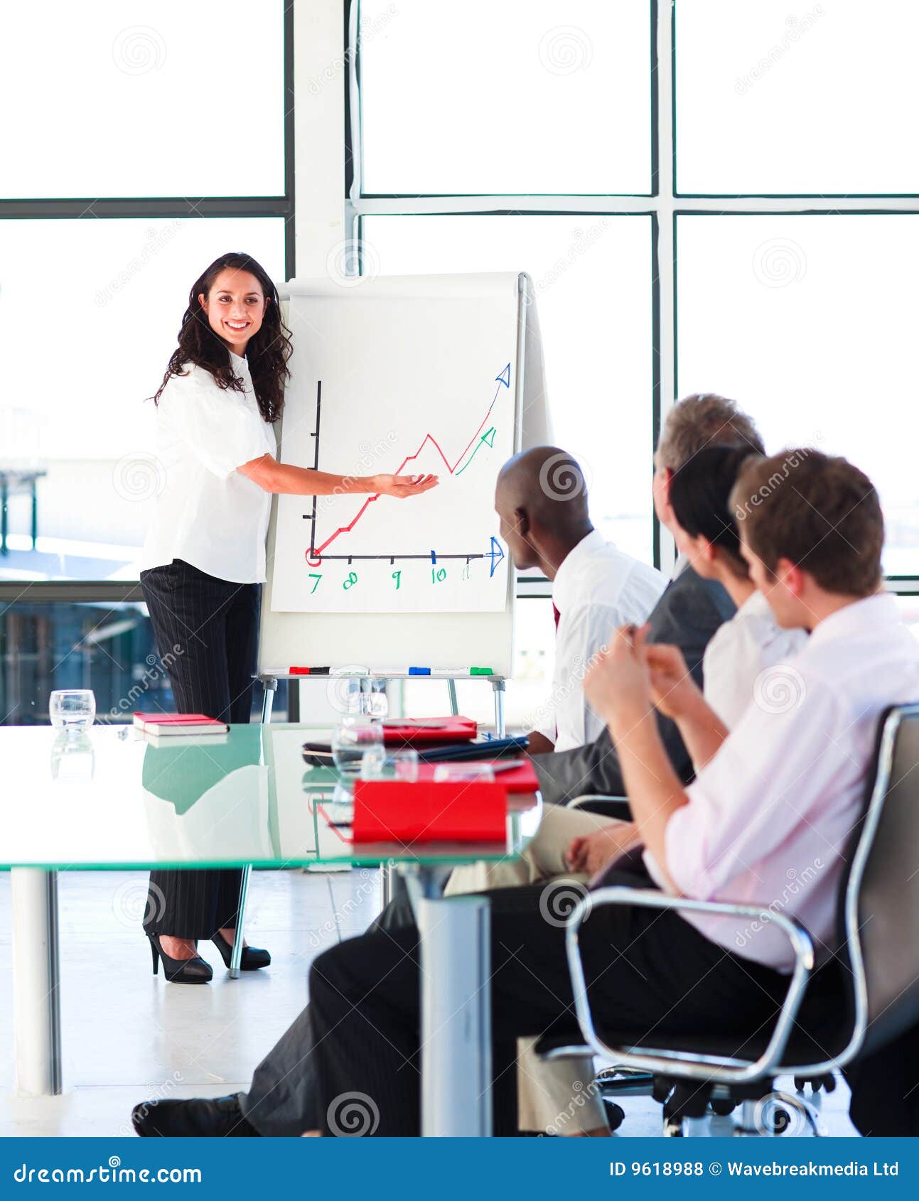 Confident Businesswoman Smiling in a Presentation Stock Photo - Image ...