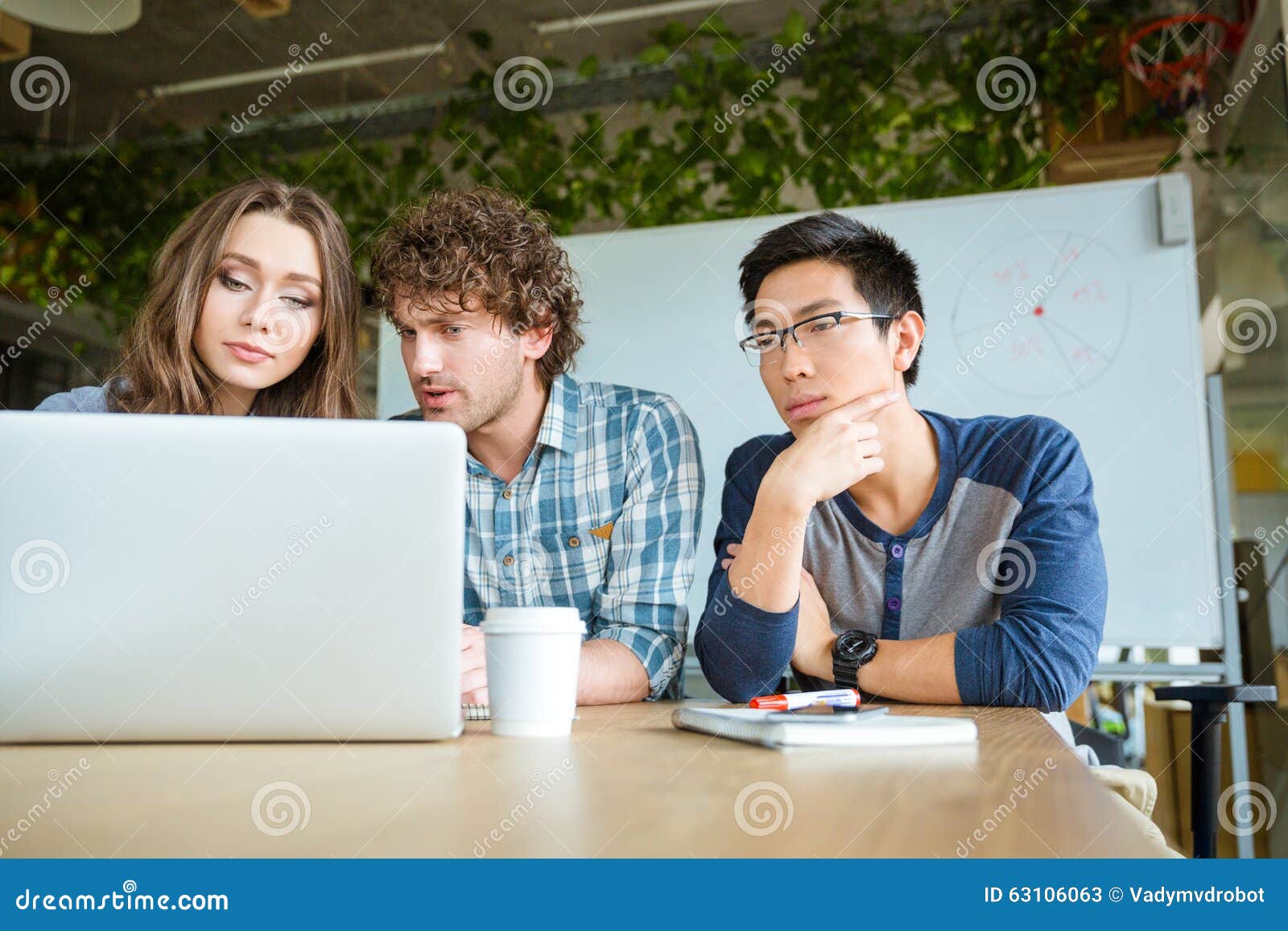 Confident Concentrated Students Learning and Studying with Laptop Stock ...