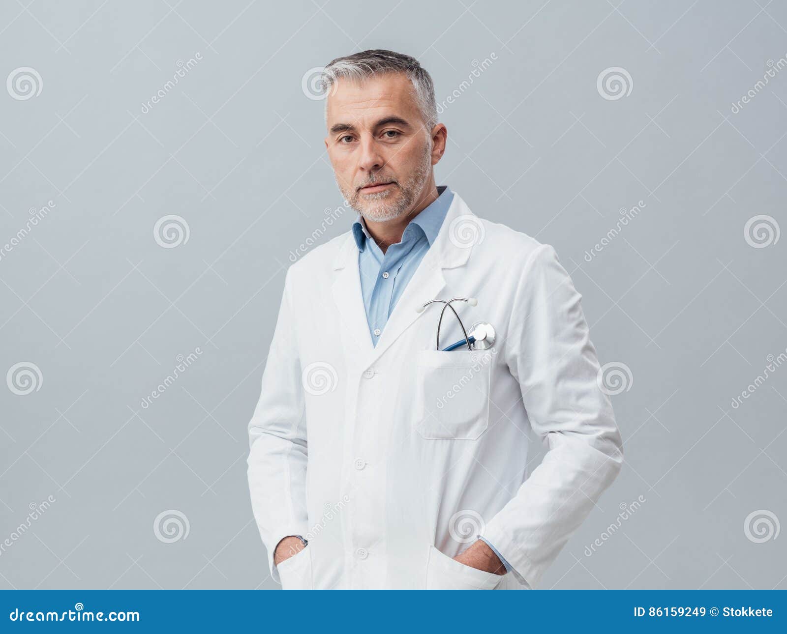 Confident doctor posing stock image. Image of camera - 86159249
