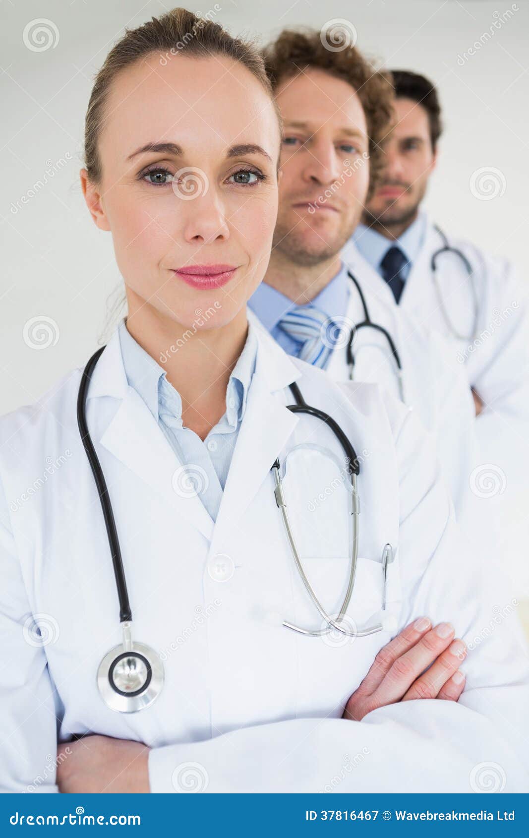 Confident Doctors Standing in a Row Stock Image - Image of adult ...