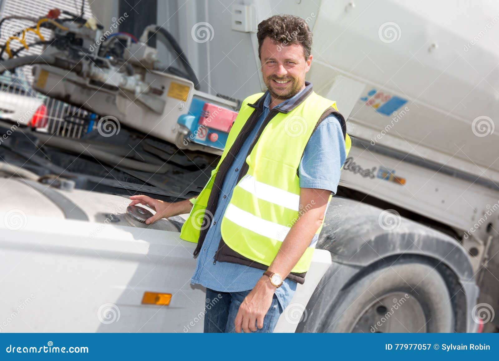 Confident Driver or Forwarder in Front of Trucks and Trailers, Stock ...