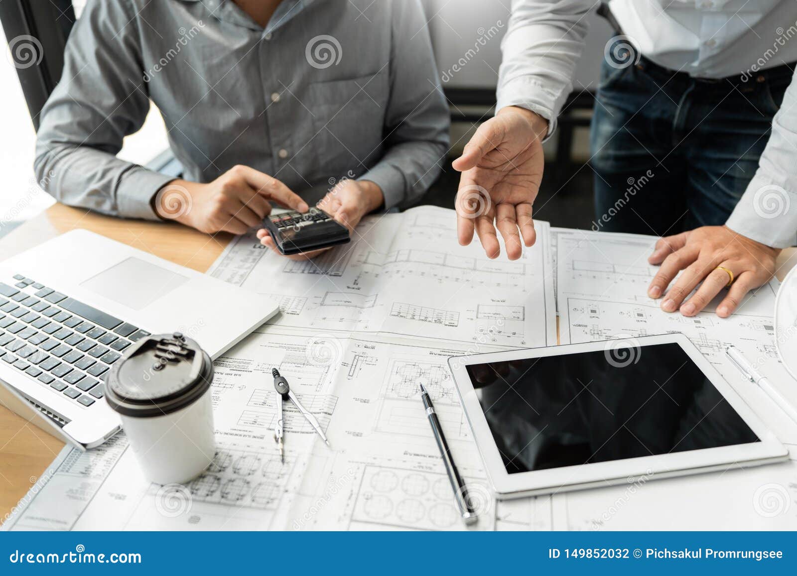 Confident Engineer Team Working with Blue Print with Architect ...