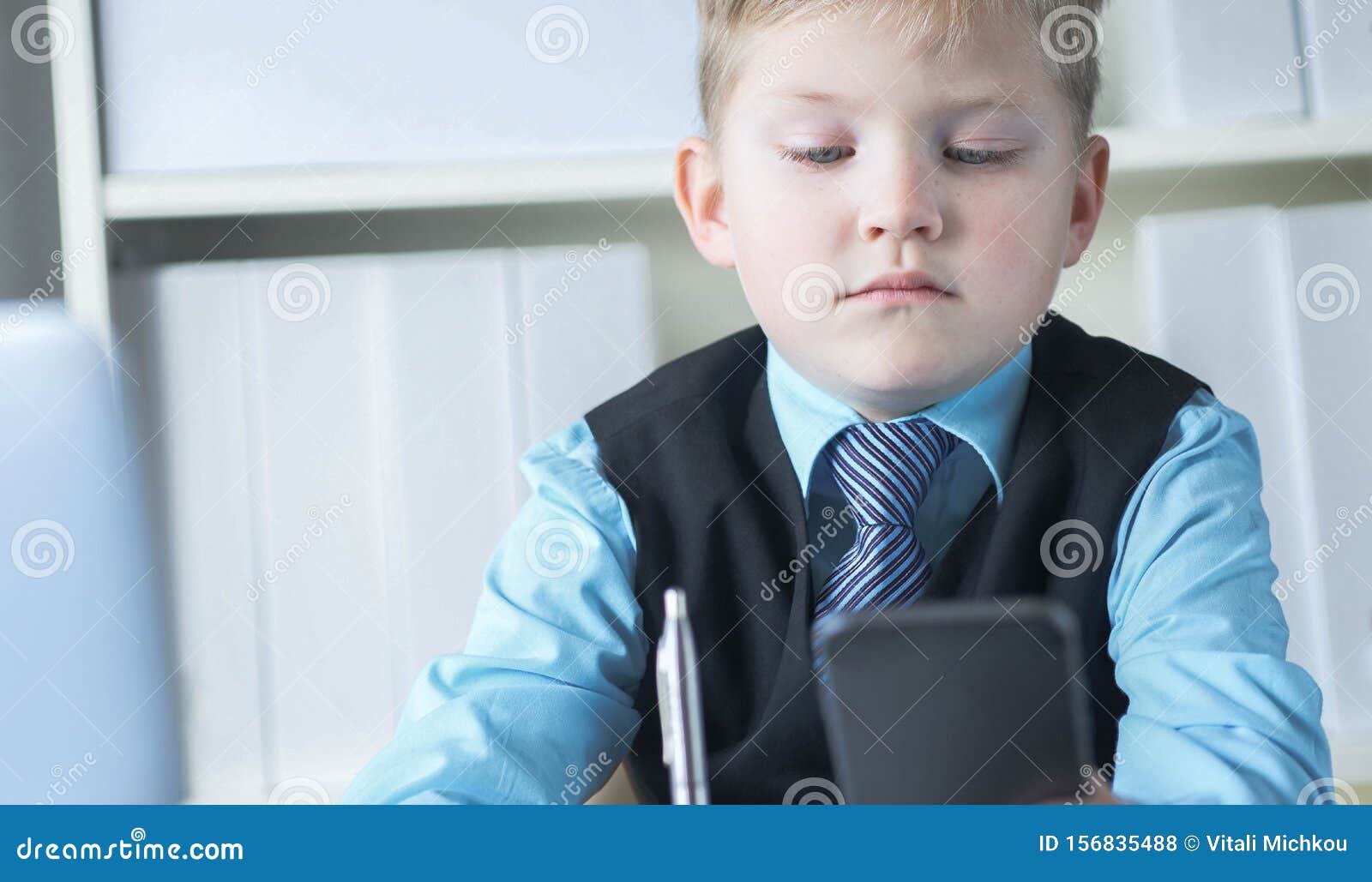 Confident Executive Boss Boy Making Notes Sitting at the Desk with ...
