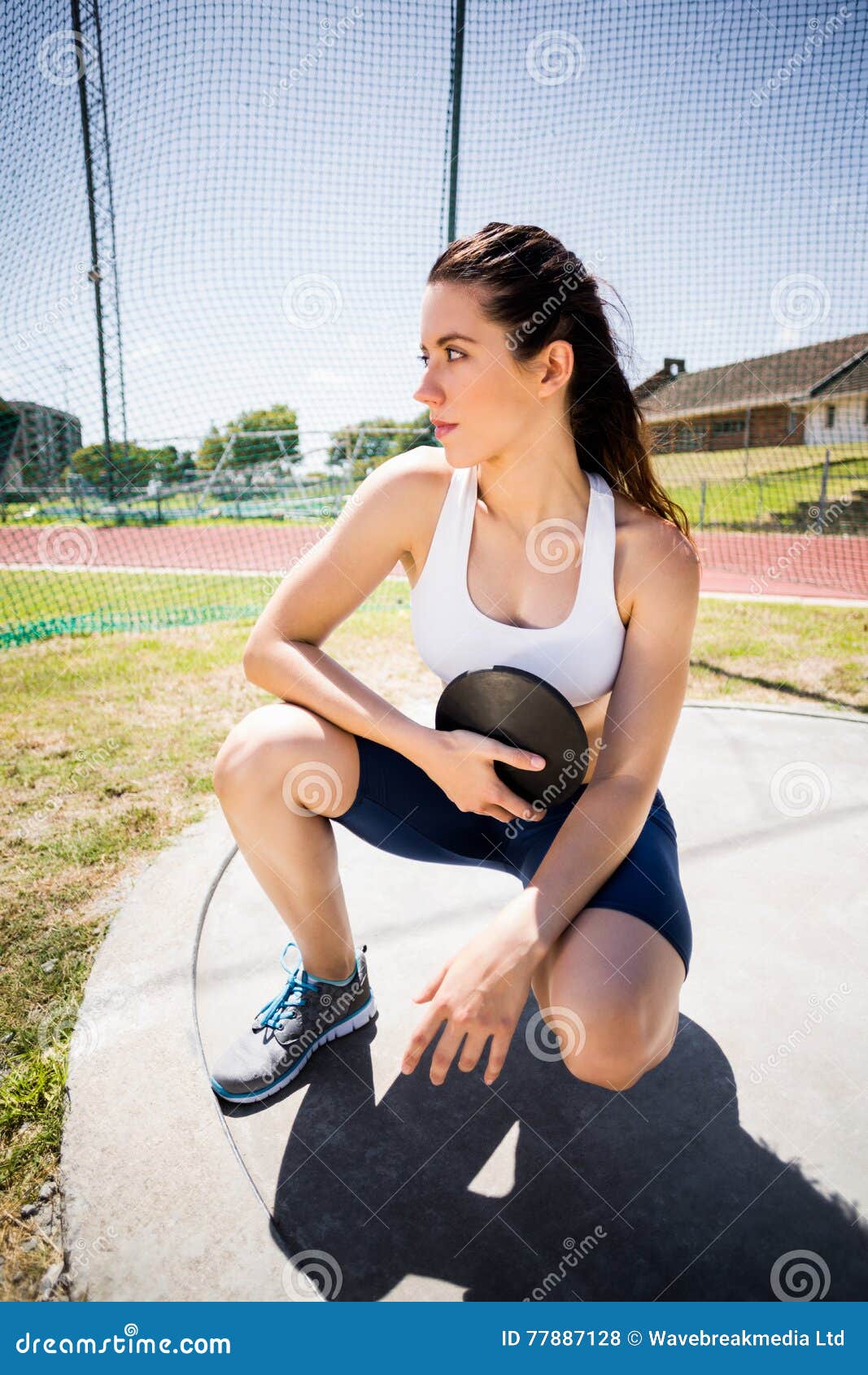 Confident Female Athlete Holding a Discus Stock Photo - Image of woman ...