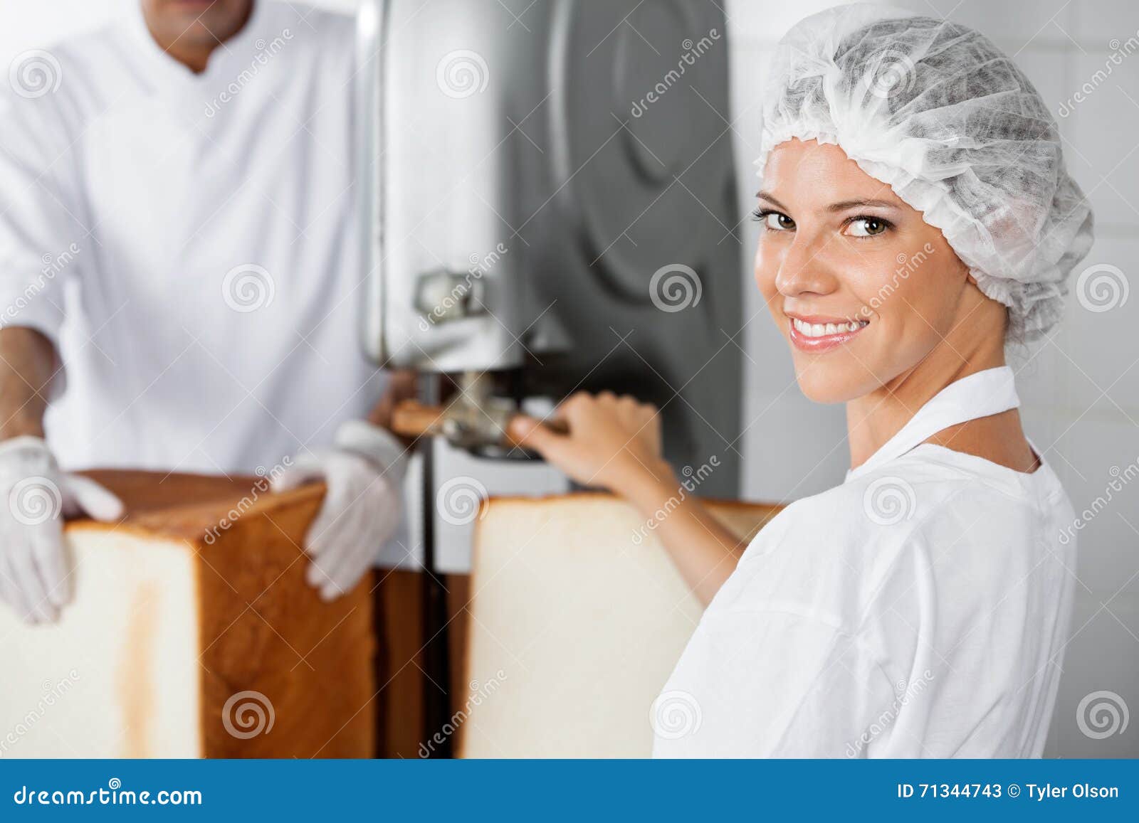 Confident Female Baker Using Cutting Machine Bakery Stock Photos - Free ...