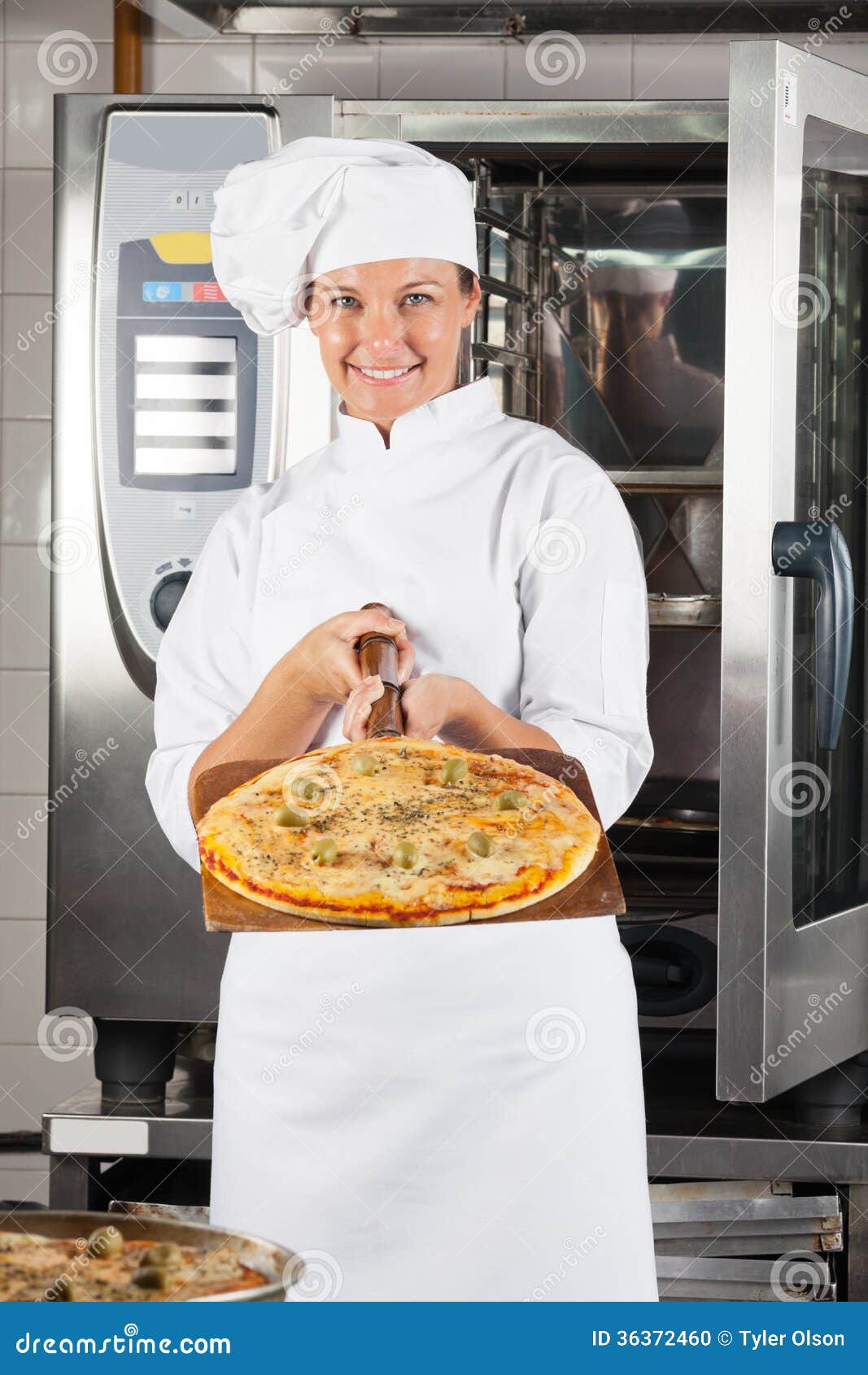 Confident Female Chef Presenting Pizza Stock Photo - Image of lifestyle ...