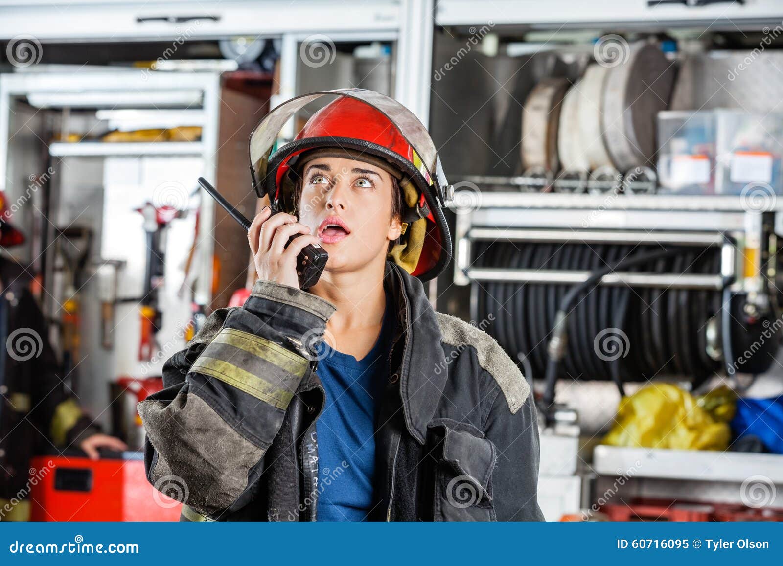 Confident Female Firefighter Using Walkie Talkie Stock Image - Image of ...