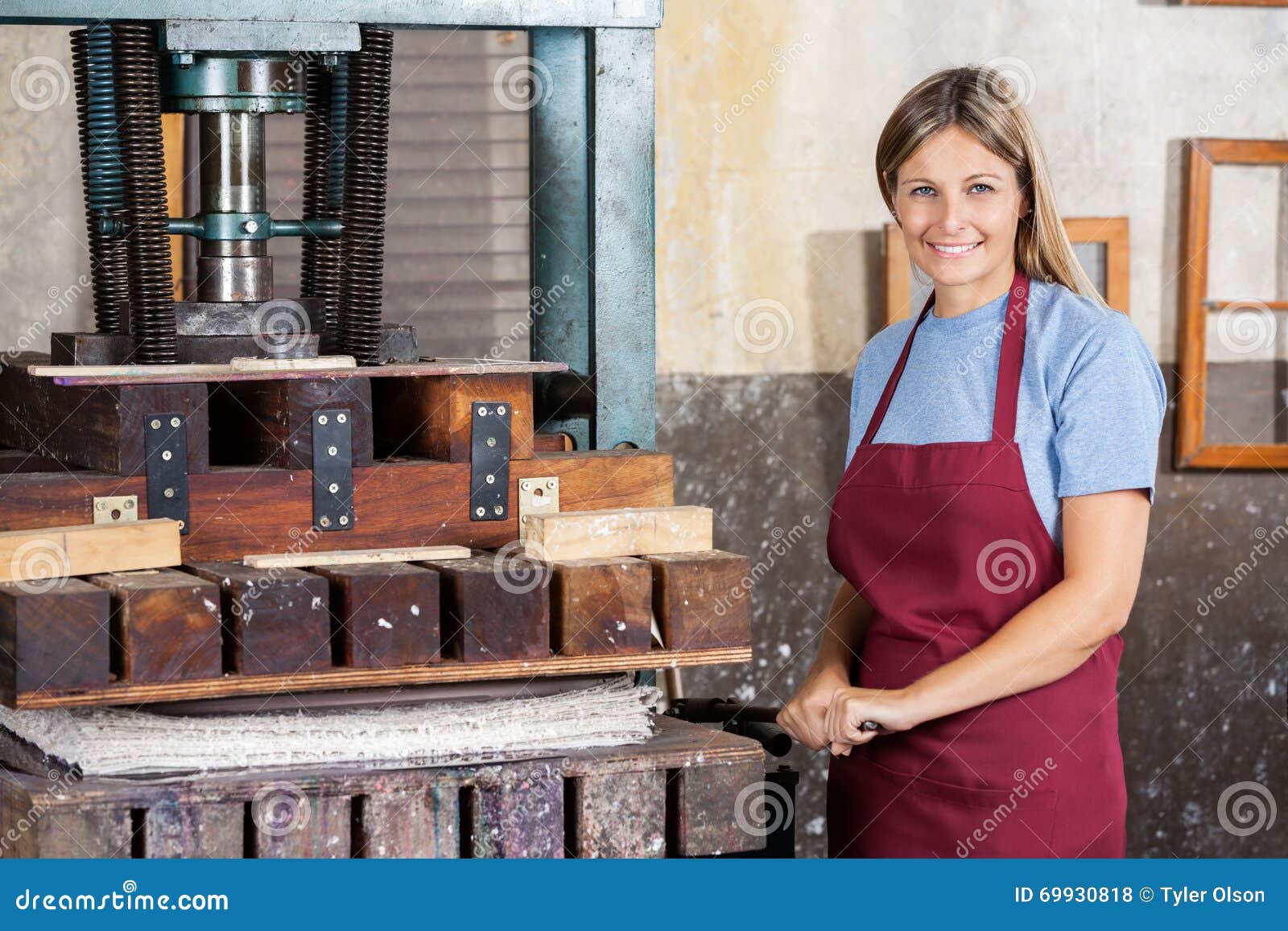 Confident Female Worker Using Paper Press Machine Stock Photo - Image ...