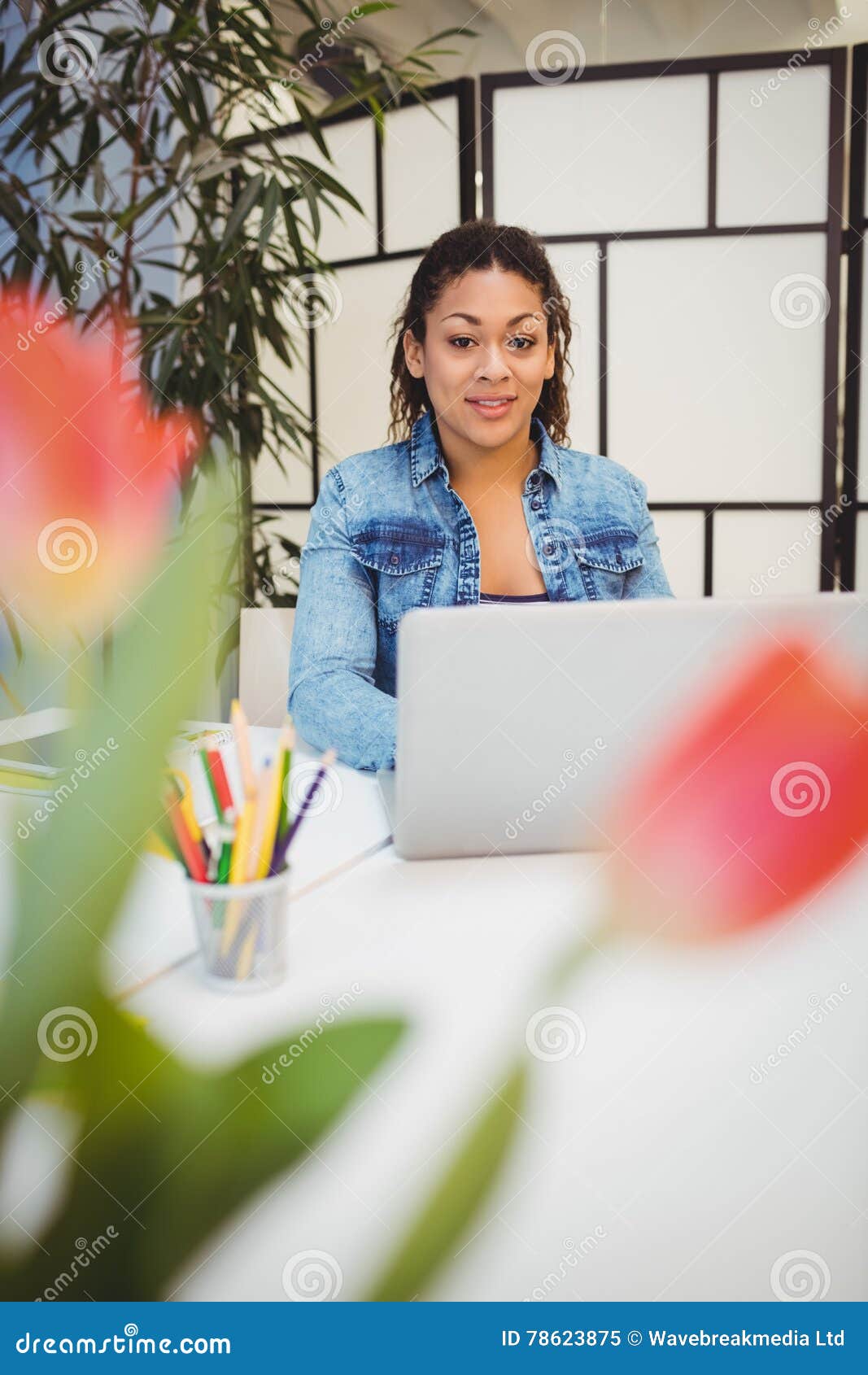 Confident Graphic Designer at Desk with Laptop Stock Image - Image of ...