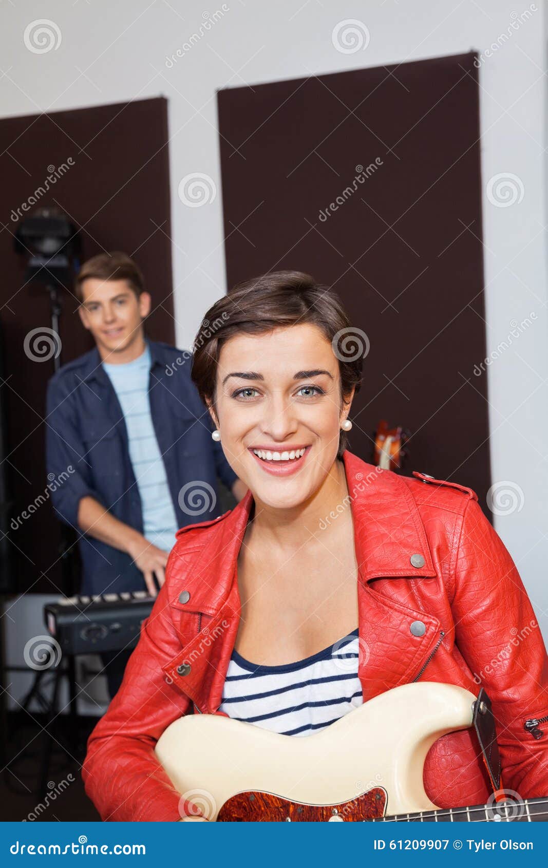 Confident Guitarist Smiling in Recording Studio Stock Image - Image of ...