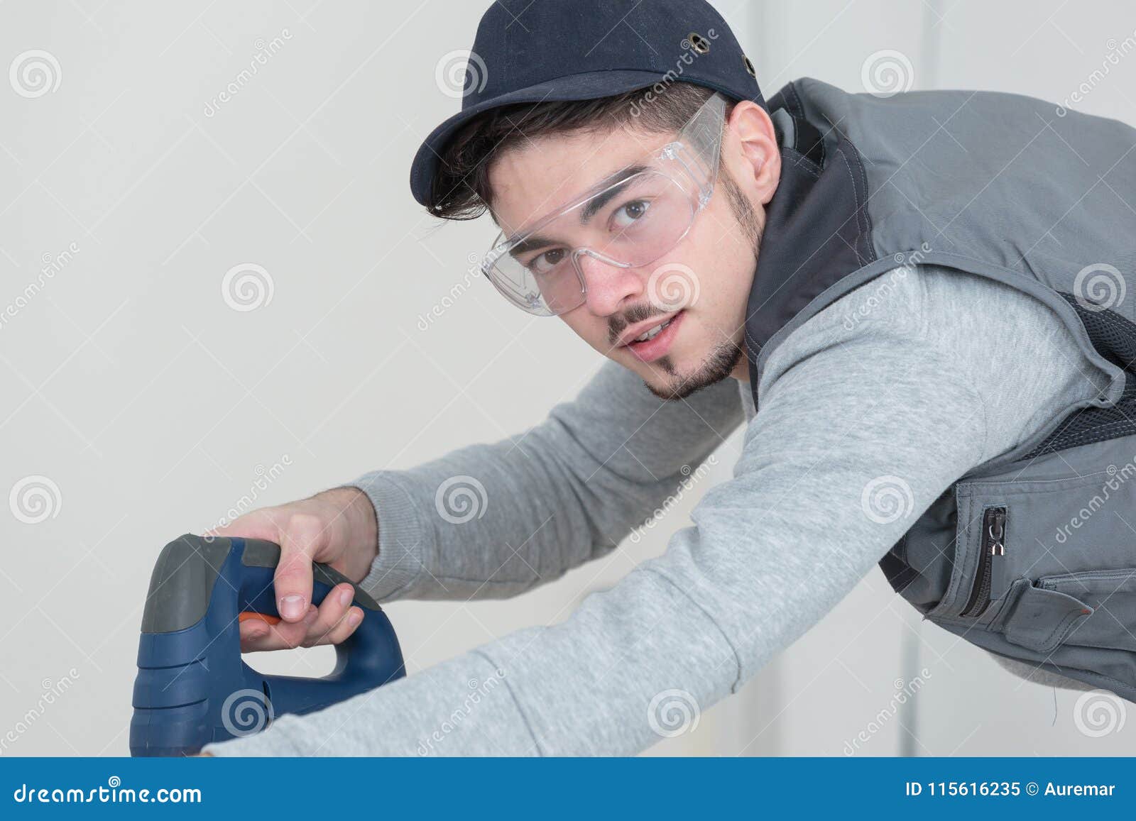 Confident Handsome Young Craftsman in Workshop Stock Image - Image of ...