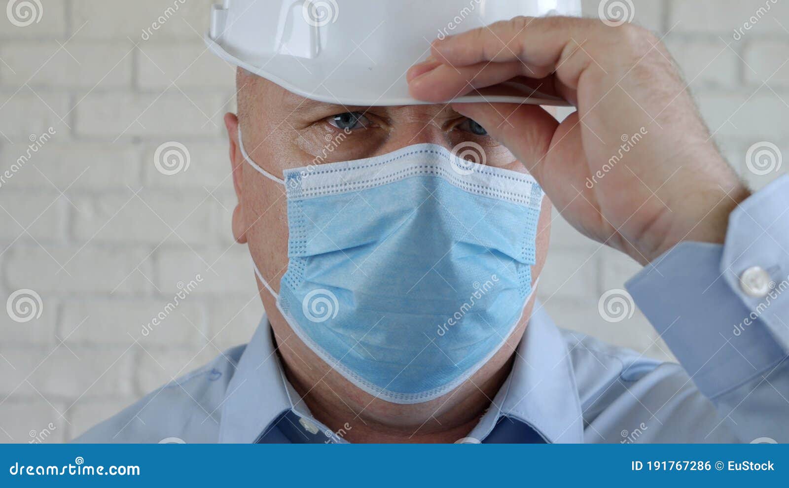 Confident Image with an Engineer Wearing Face Protection Mask Against ...