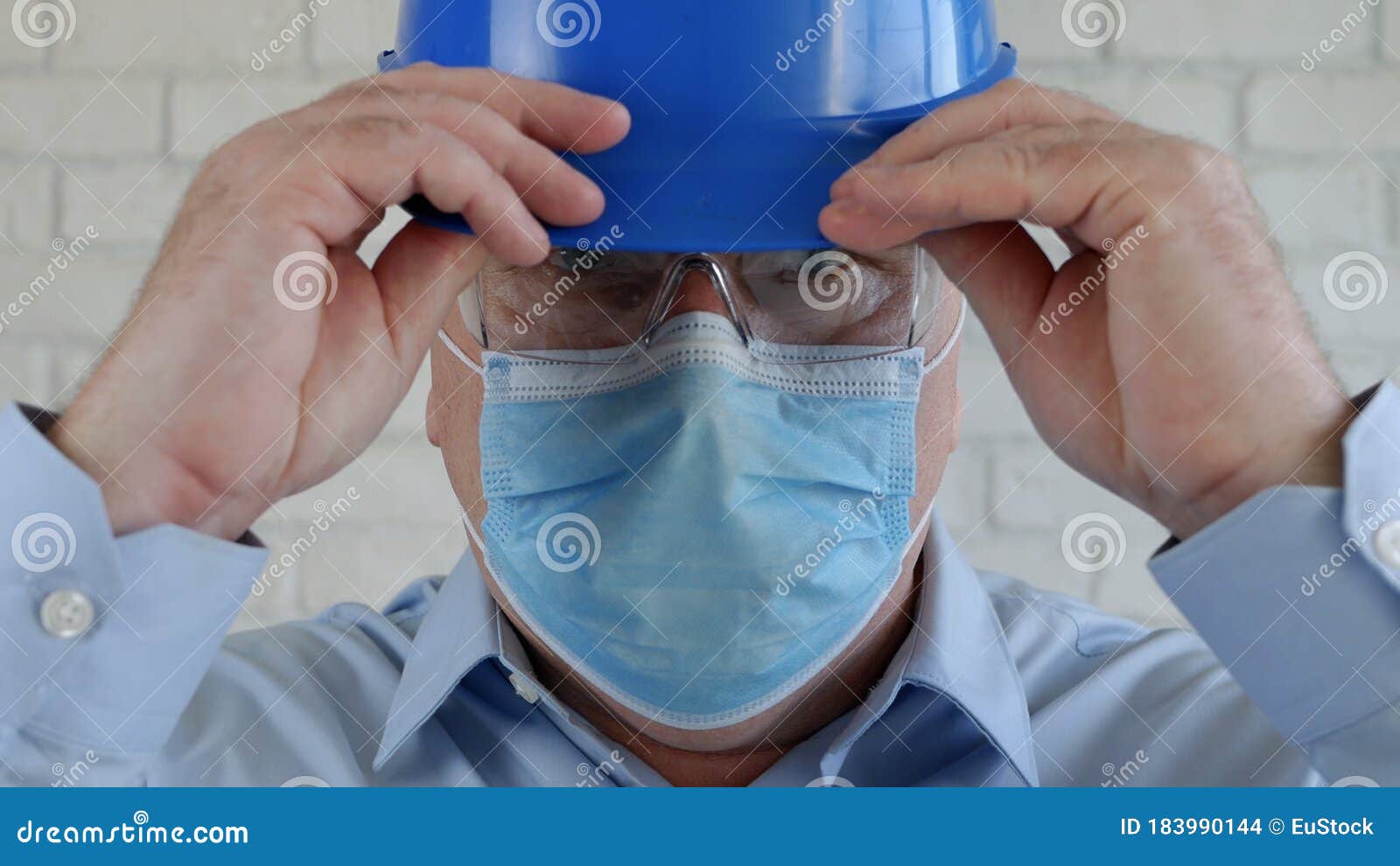 Confident Image with an Engineer Wearing Face Protection Mask Against ...