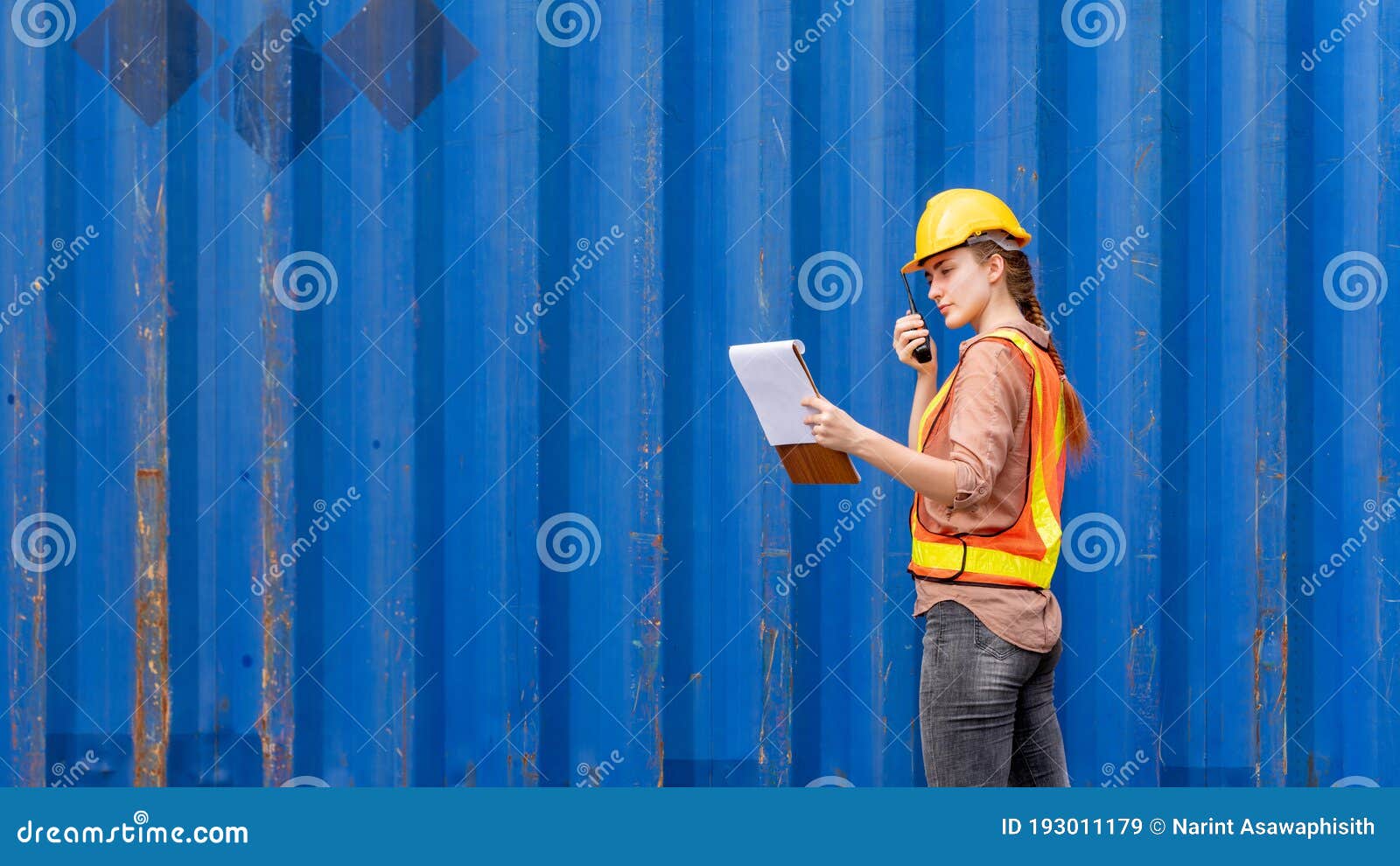 Confident Inspector Standing in Front of Cargo Container in Shipping ...