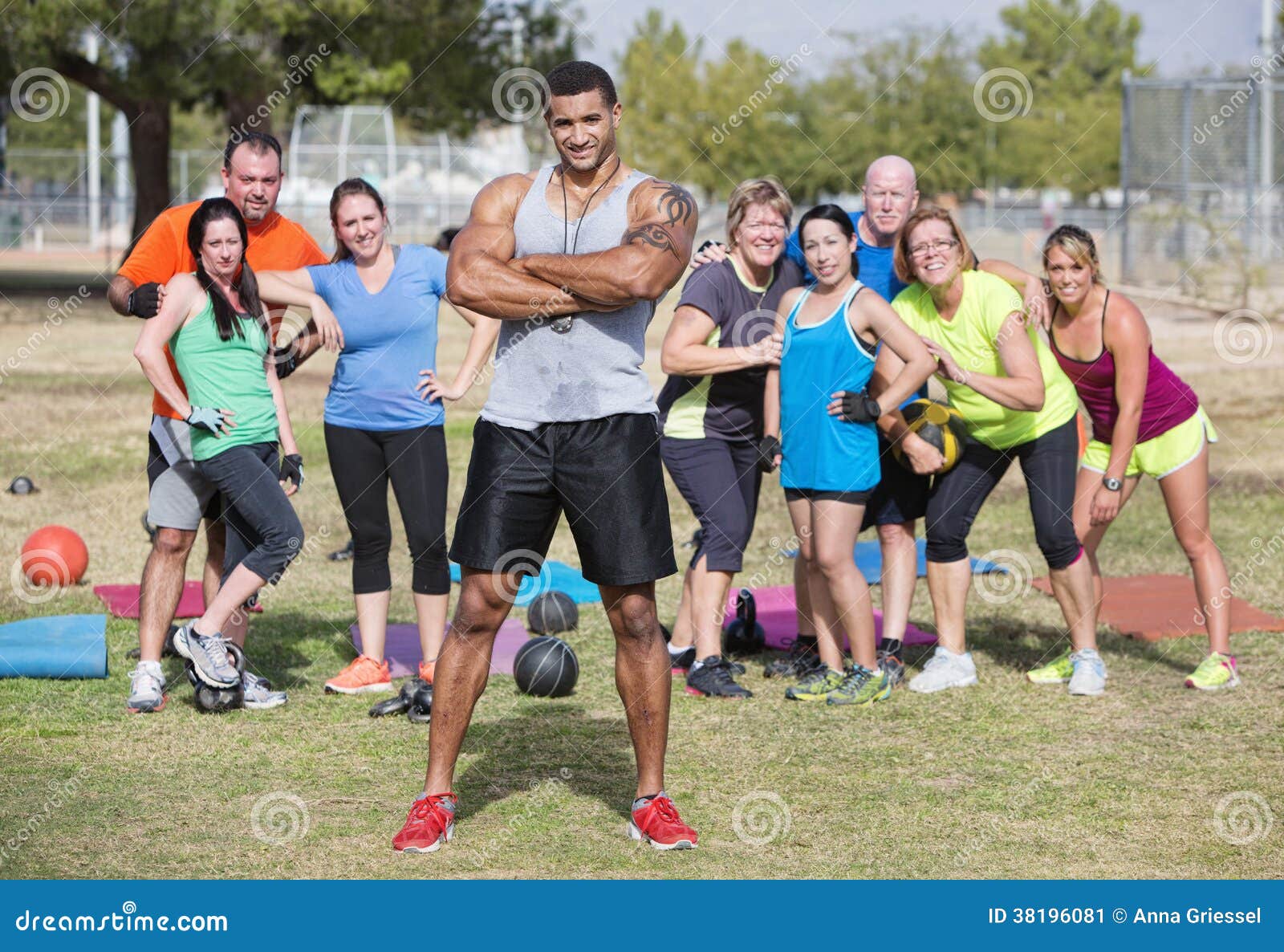 Confident Instructor with Fitness Class Stock Image - Image of ...